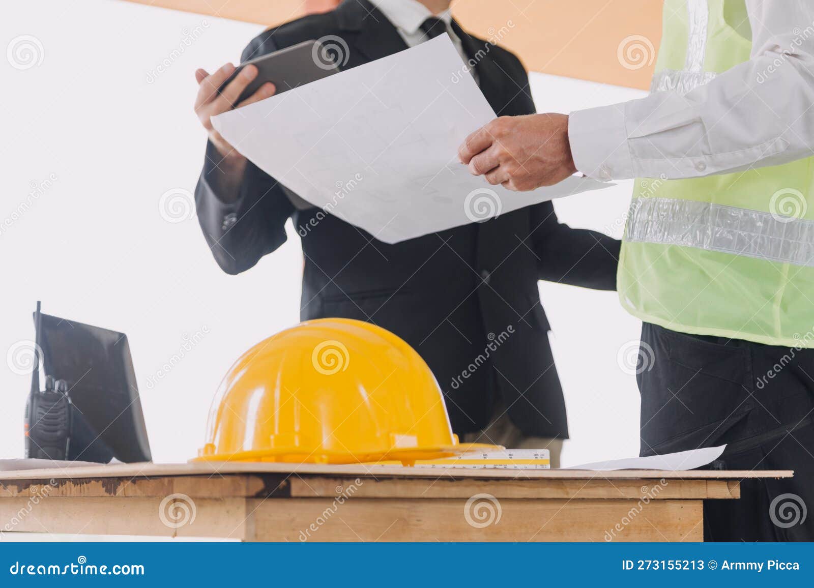 Diverse Team of Specialists Use Tablet Computer on Construction Site ...