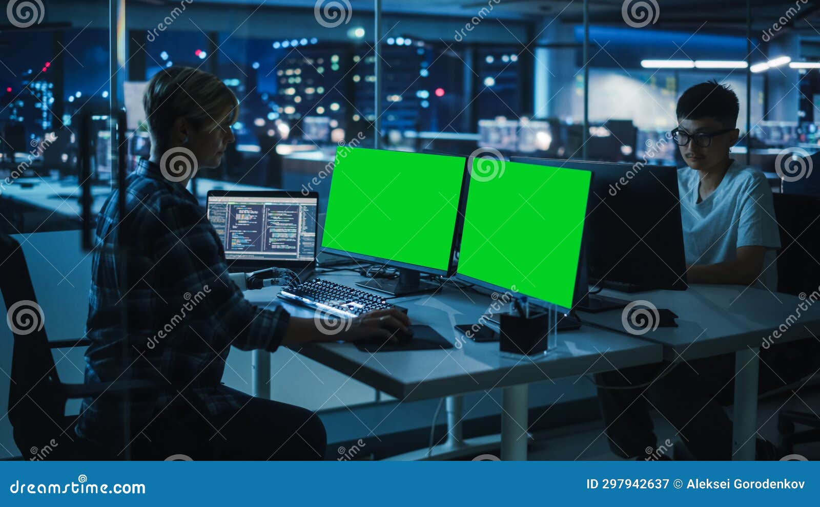 Diverse Teamwork in Office at Night: Person with Disability Using ...