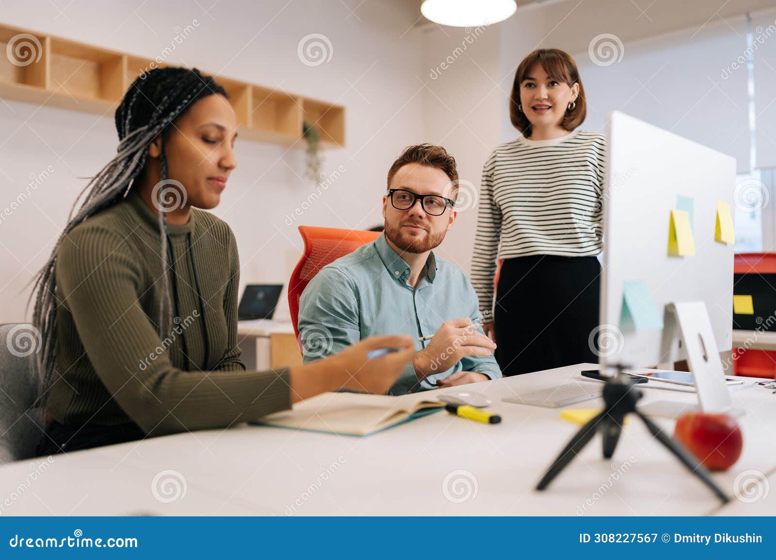 Diverse Three Colleagues Working Together Discussing Computer Project ...