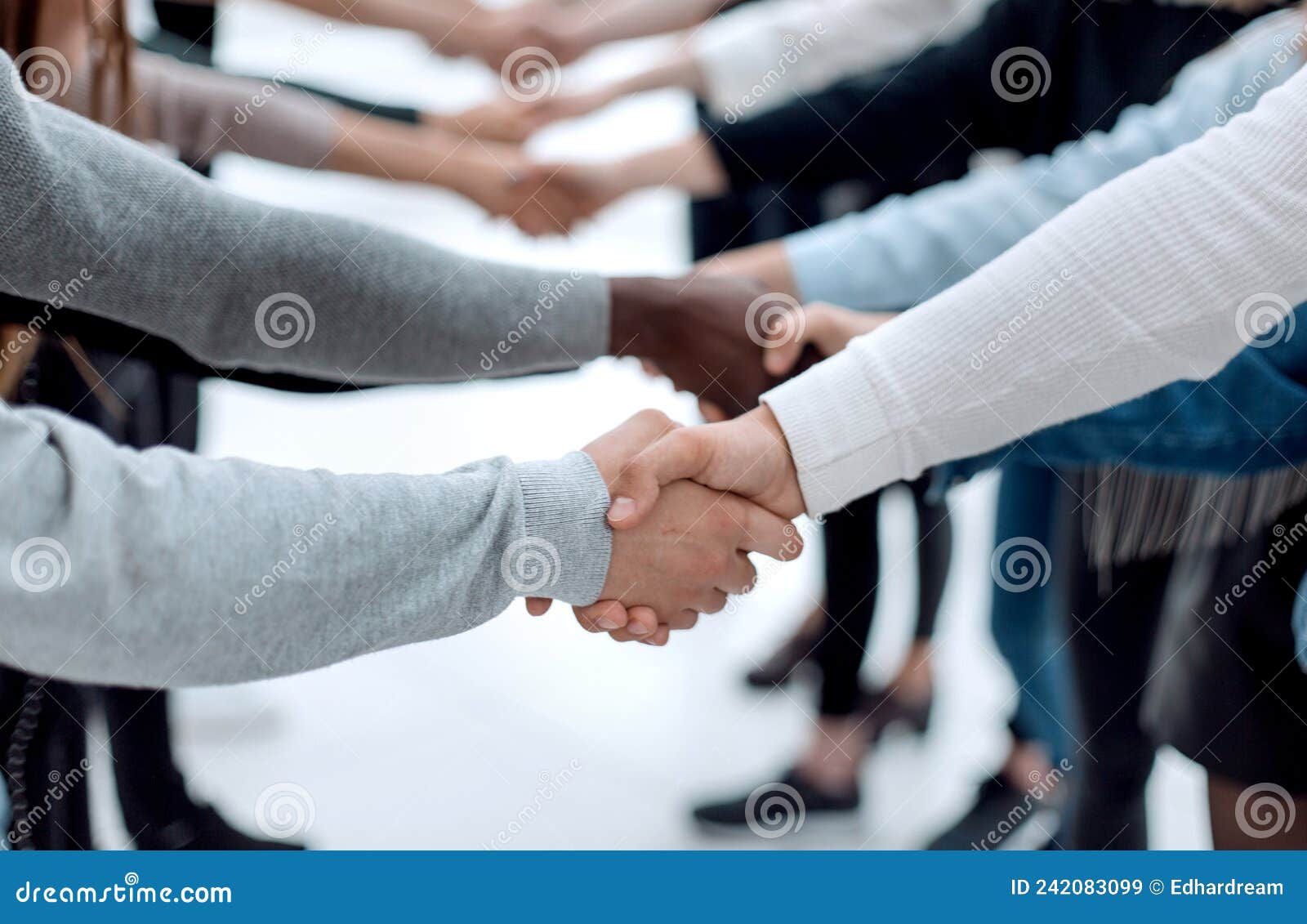 Diverse Young People Shaking Hands with Each Other Stock Image - Image ...