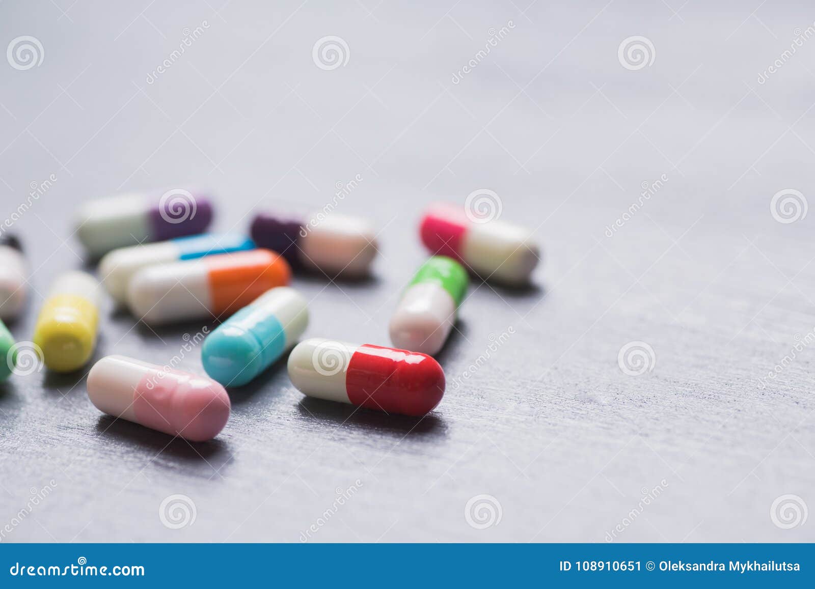 Diversity of Colorful Different Capsules on Gray Table Stock Image ...