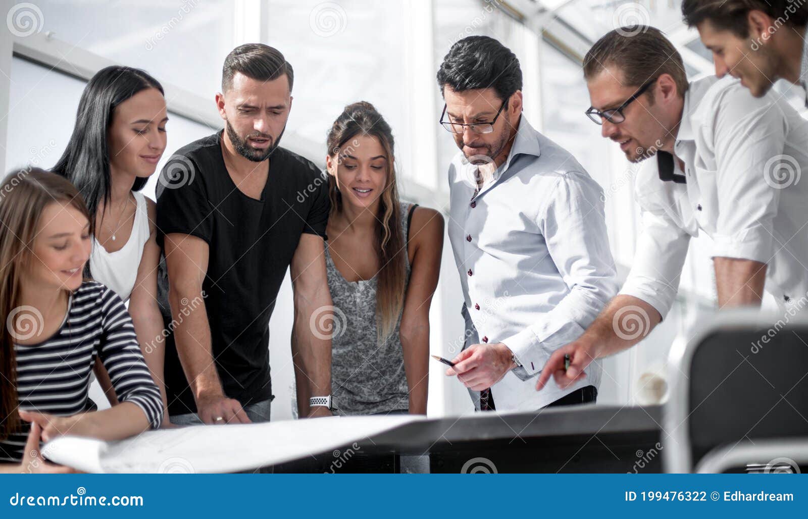 Diversity Group is Working Together on an Architectural Project Stock ...