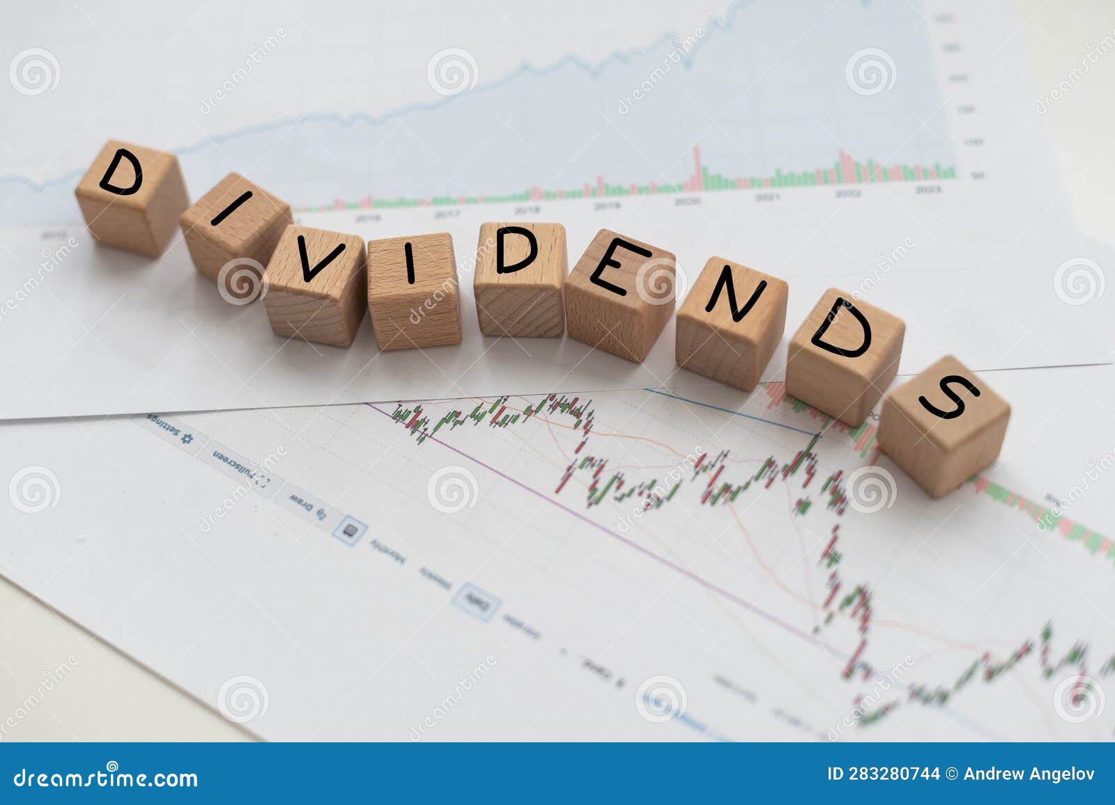 DIVIDENDS Text on Documents with Graphs, Charts, Calculator, Pen ...