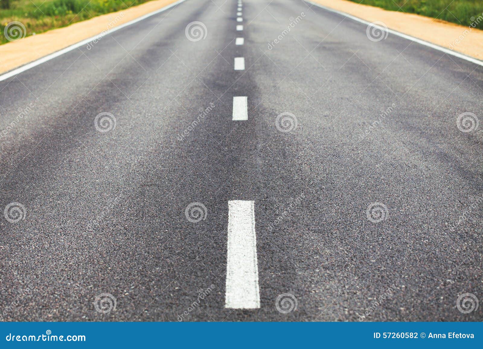 Dividing line on the road stock photo. Image of macro - 57260582