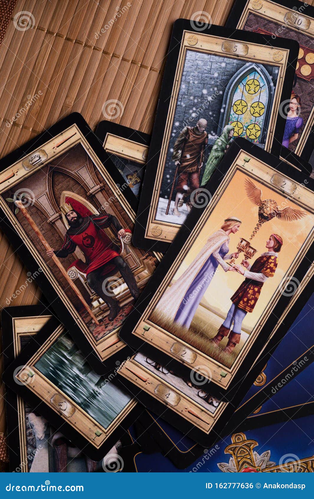 Divination By Tarot Cards. The Fortune Teller Predicts The Fate Of The ...