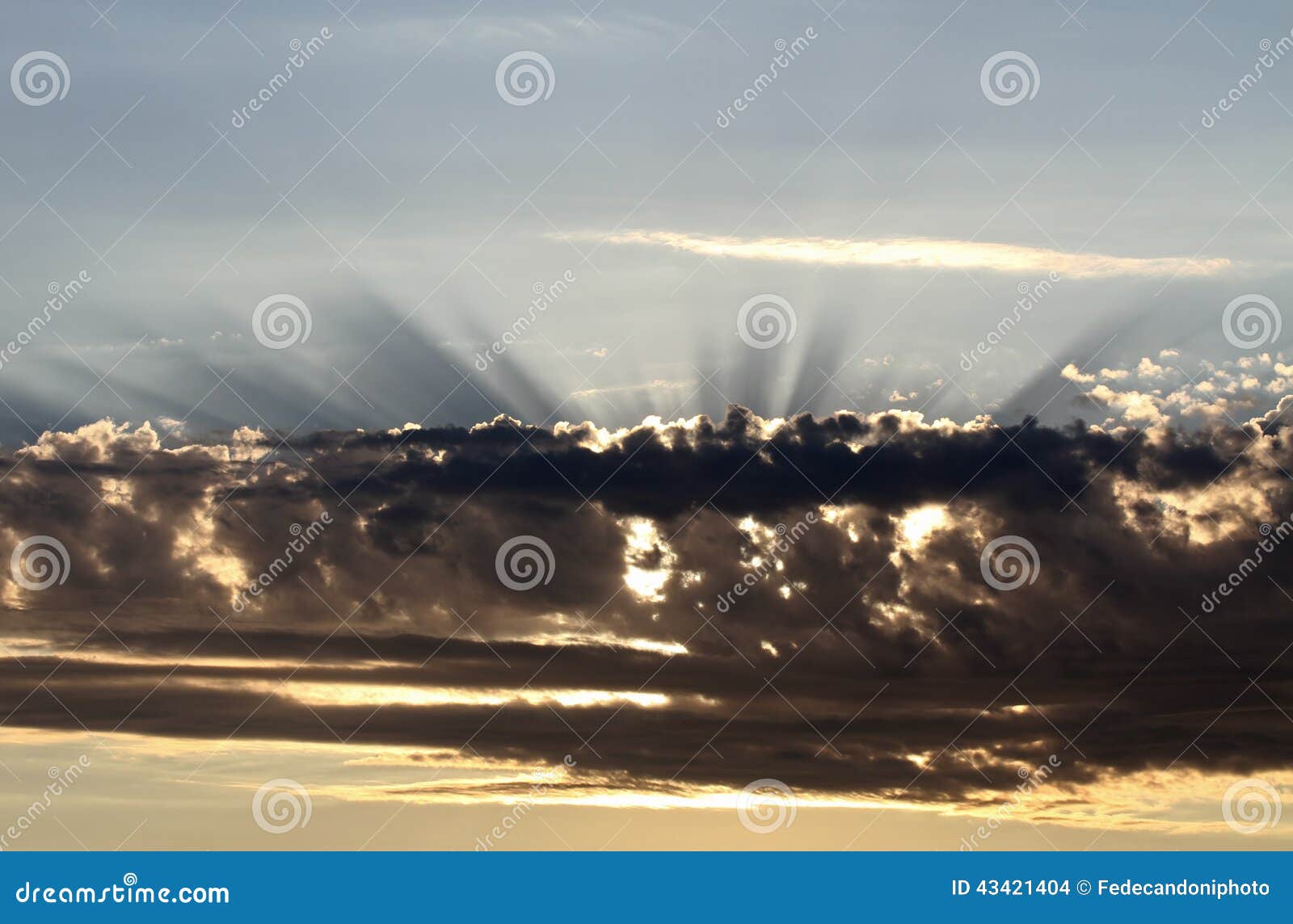 Divine Light Shining from Behind the Clouds Stock Photo - Image of ...