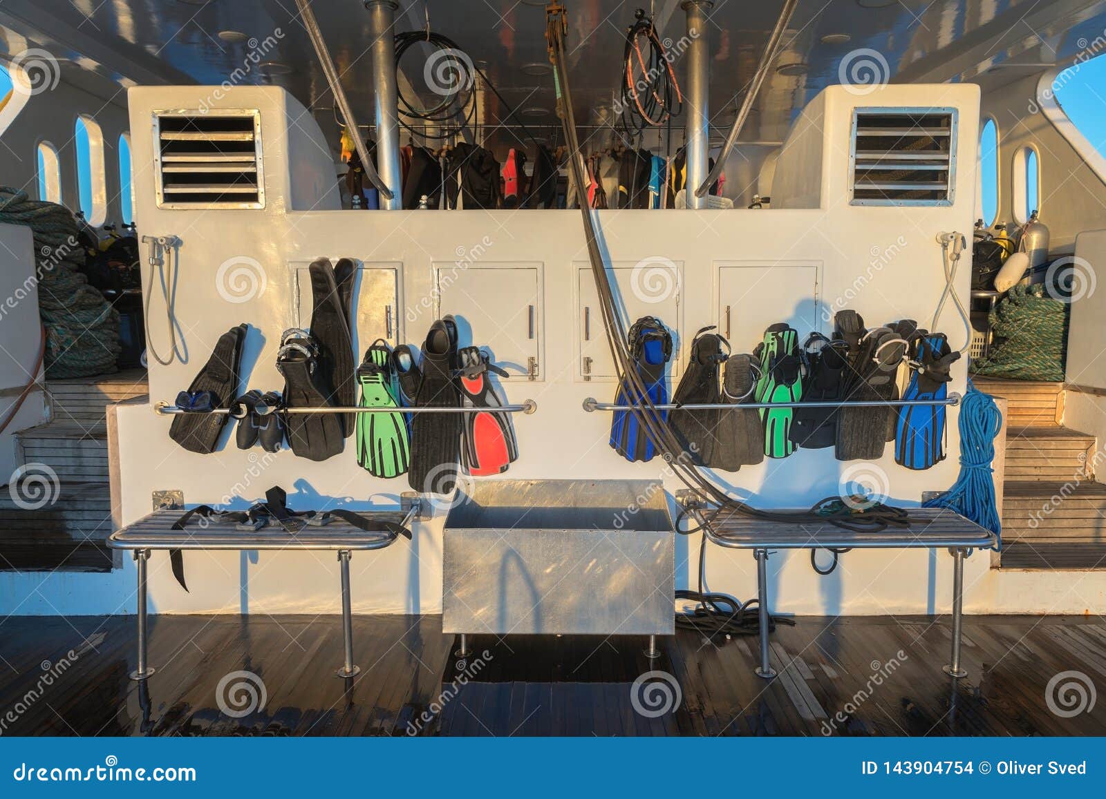 Diving fins on the boat stock photo. Image of water - 143904754