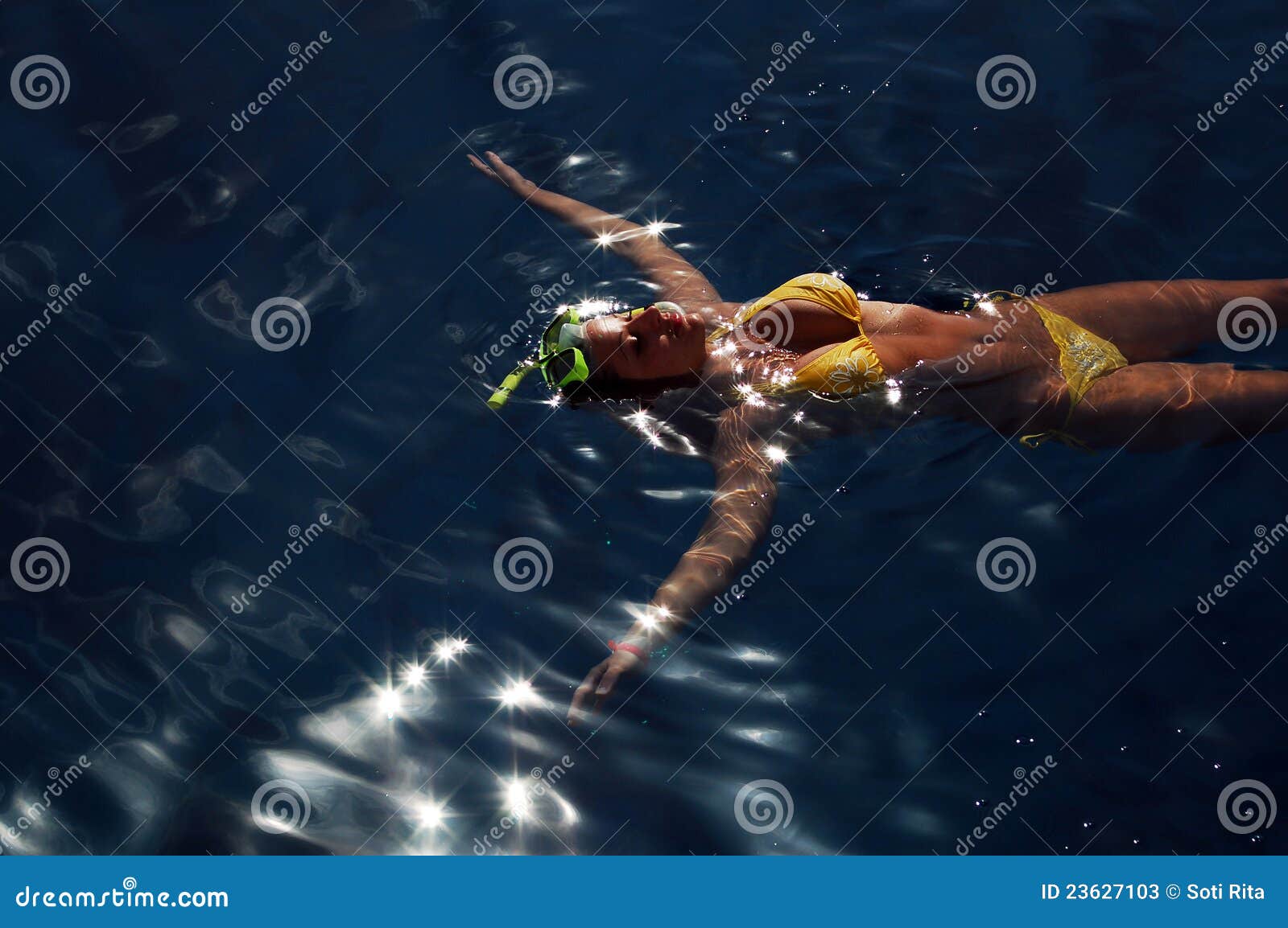 Diving Girl in the Sea Surface Stock Image - Image of yellow, relax ...