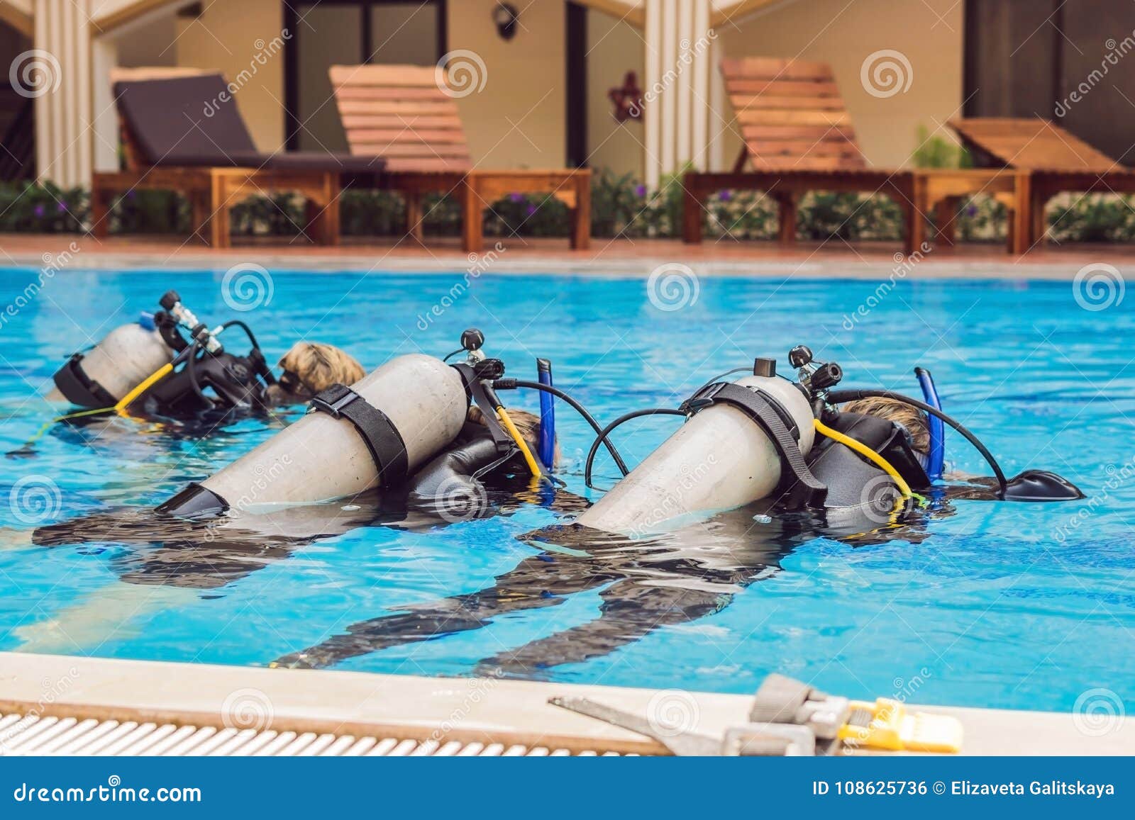 Diving Instructor and Students. Instructor Teaches Students To D Stock ...