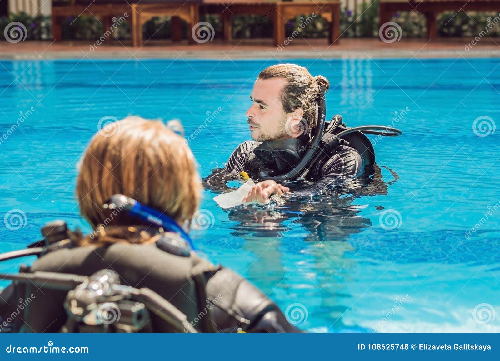Diving Instructor and Students. Instructor Teaches Students To D Stock ...