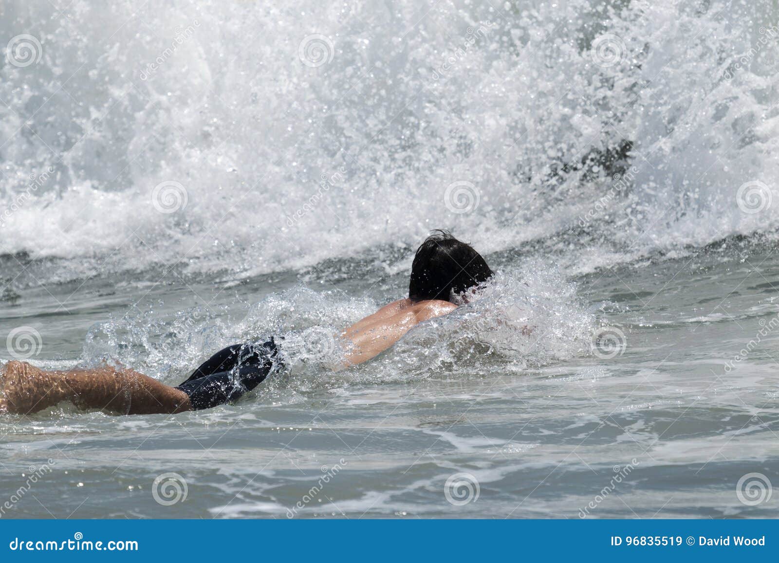 Diving into a large wave stock image. Image of rough - 96835519