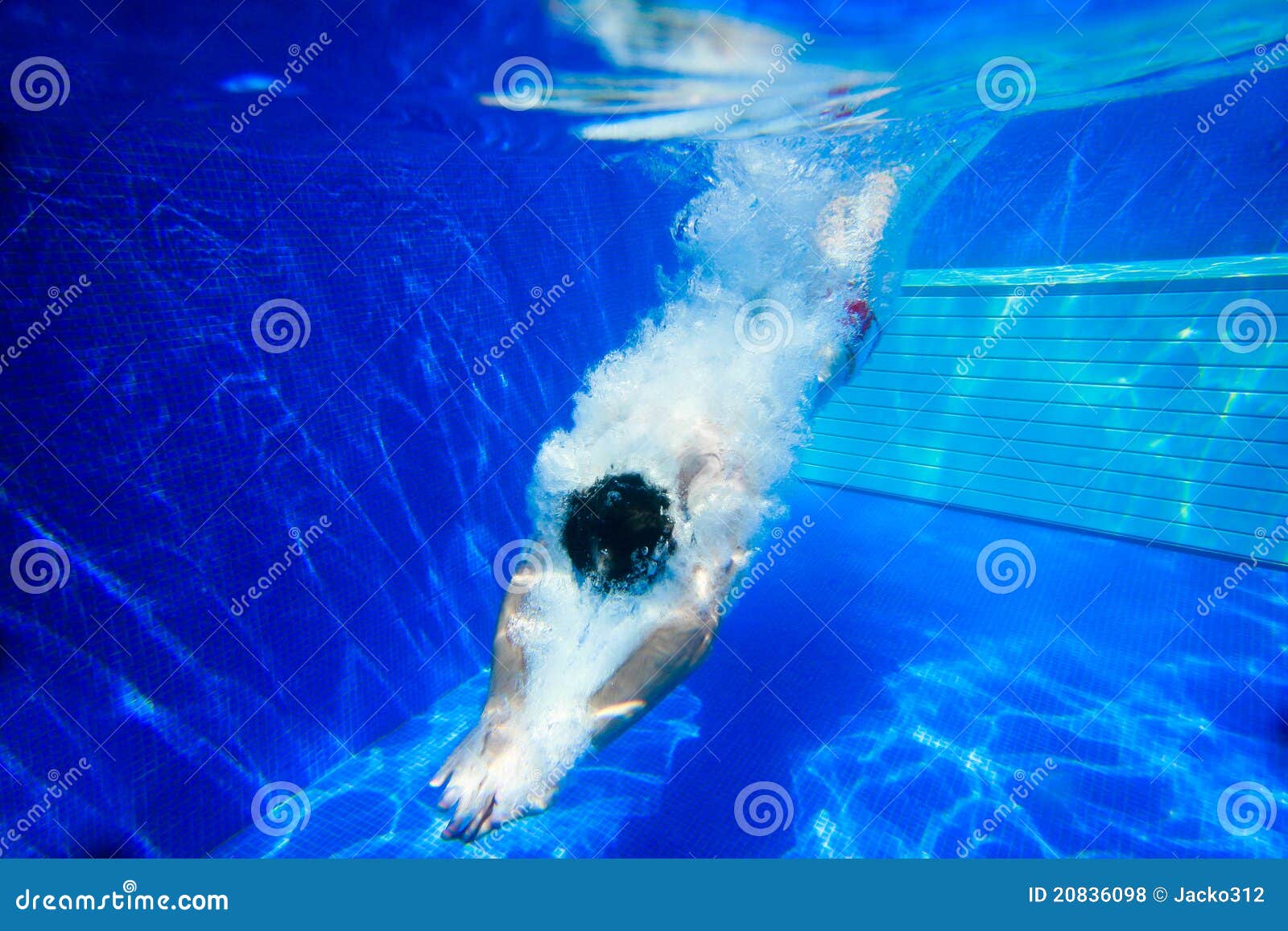Diving into a Swimming Pool Stock Photo - Image of adult, bubbles: 20836098