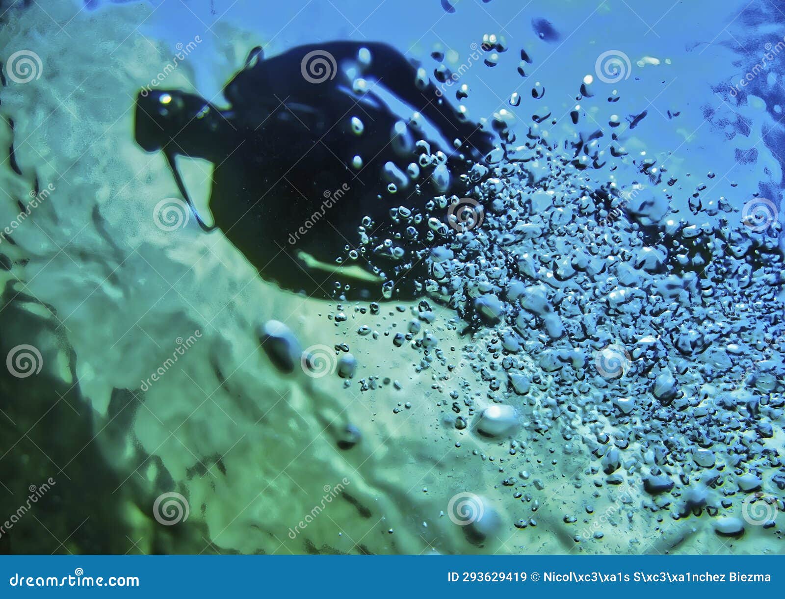 Diving into the Unknown: Enigmatic Silhouette of a Diver Surrounded by ...