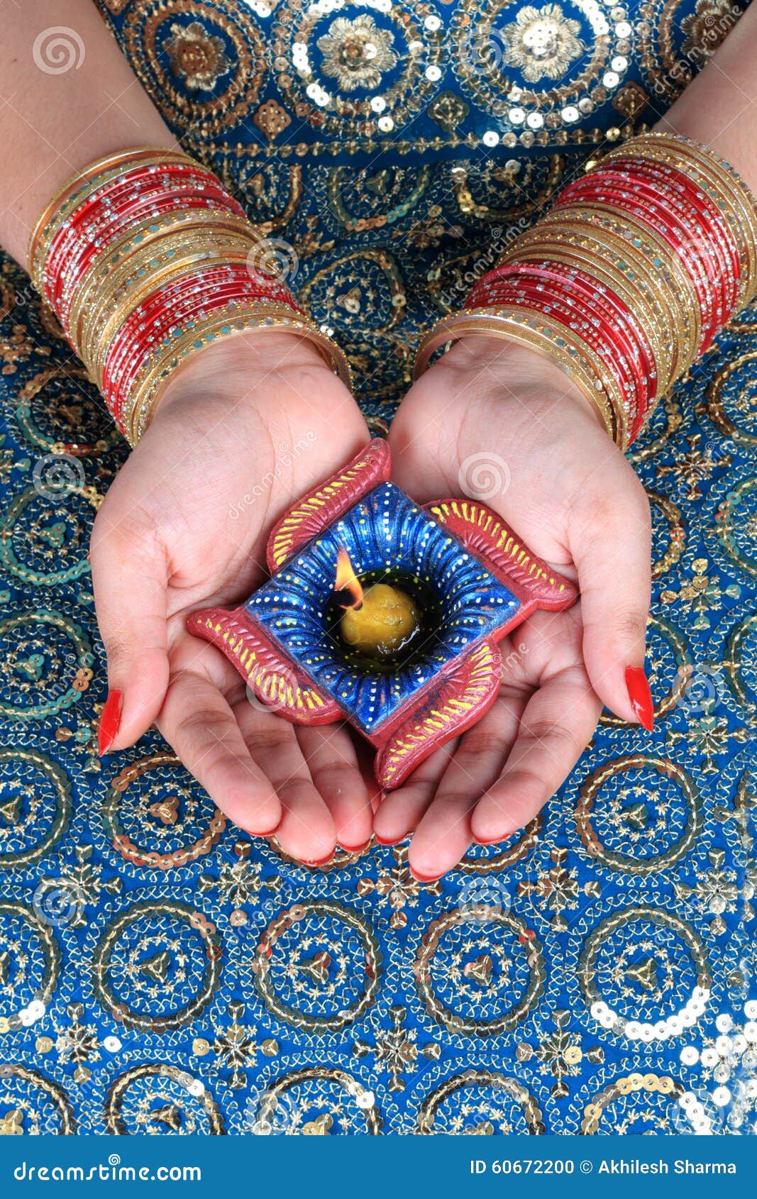 Diwali Celebration Diya on a Female Hand Stock Photo - Image of ...