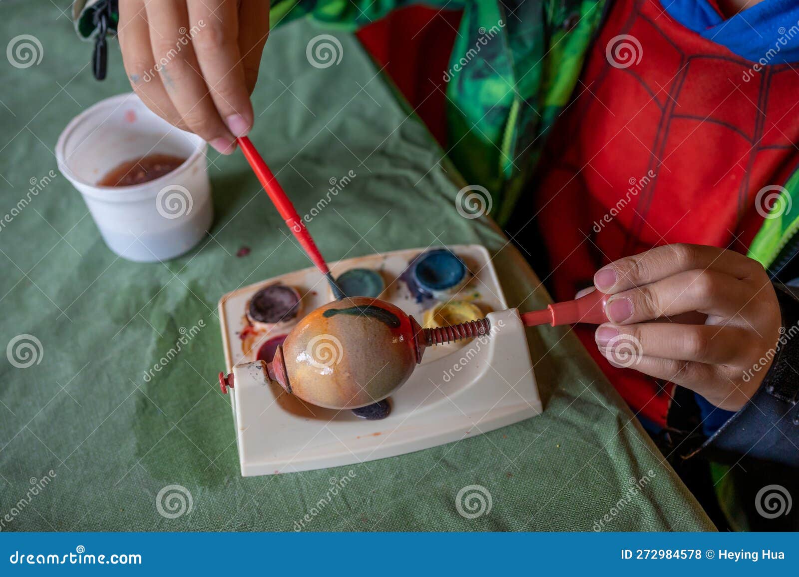 DIY Easter Eggs with Watercolor Painting Tools on Table. Hand ...