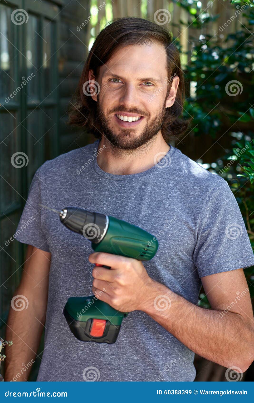 DIY man holding drill stock image. Image of portrait - 60388399