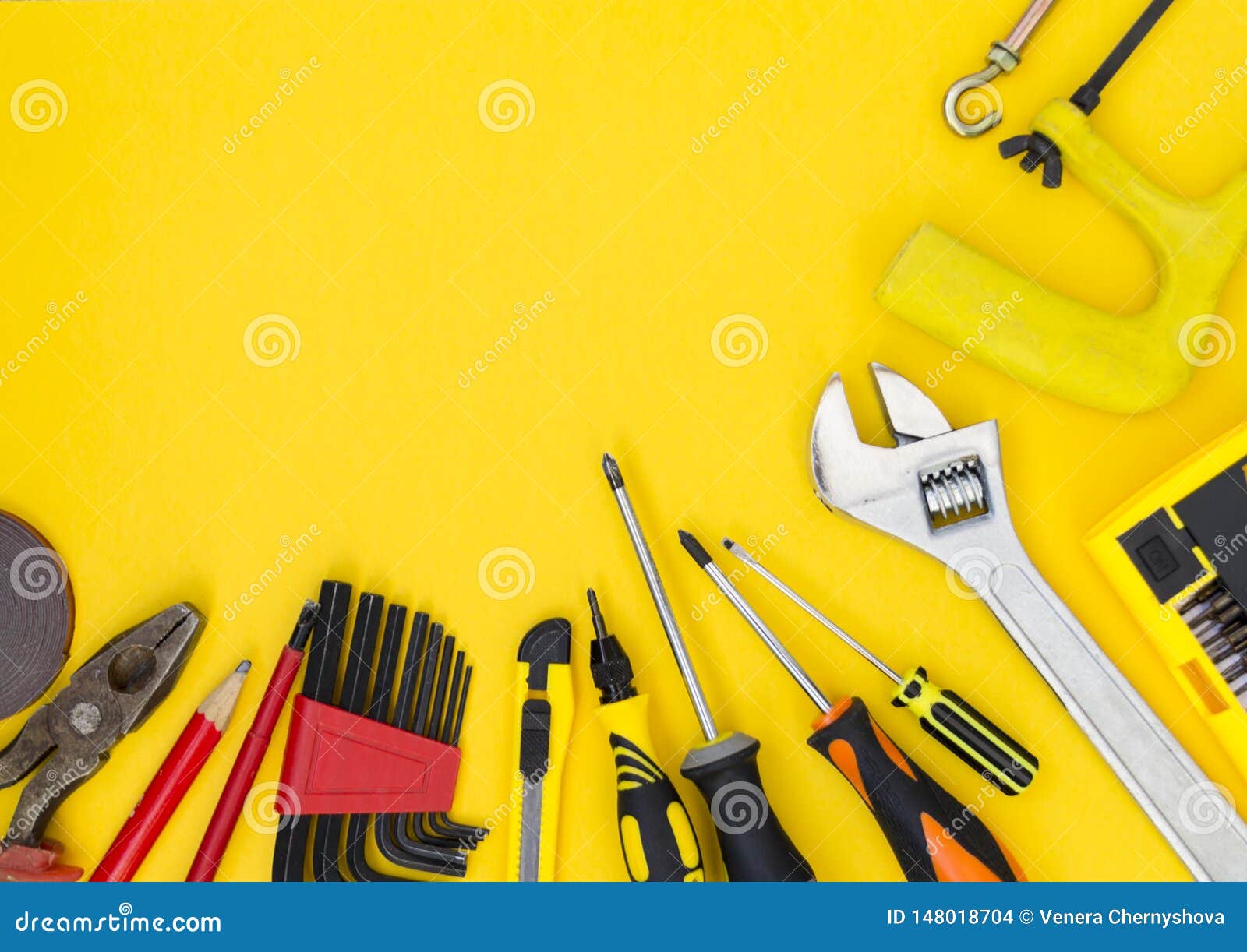DIY Tool Set. Tools Lie on a Yellow Background. There is a Place for ...