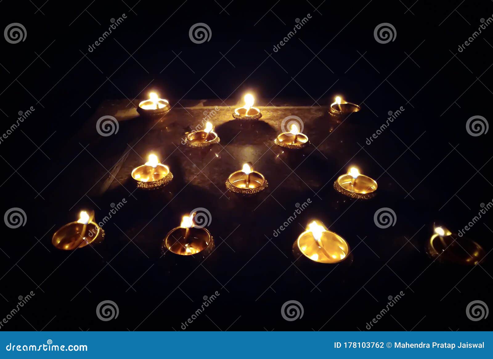 Diya lit by oil and thread stock photo. Image of diya - 178103762