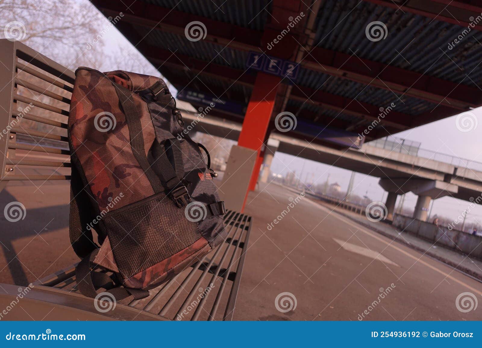 Backpack on a Bench without People Stock Photo - Image of people ...