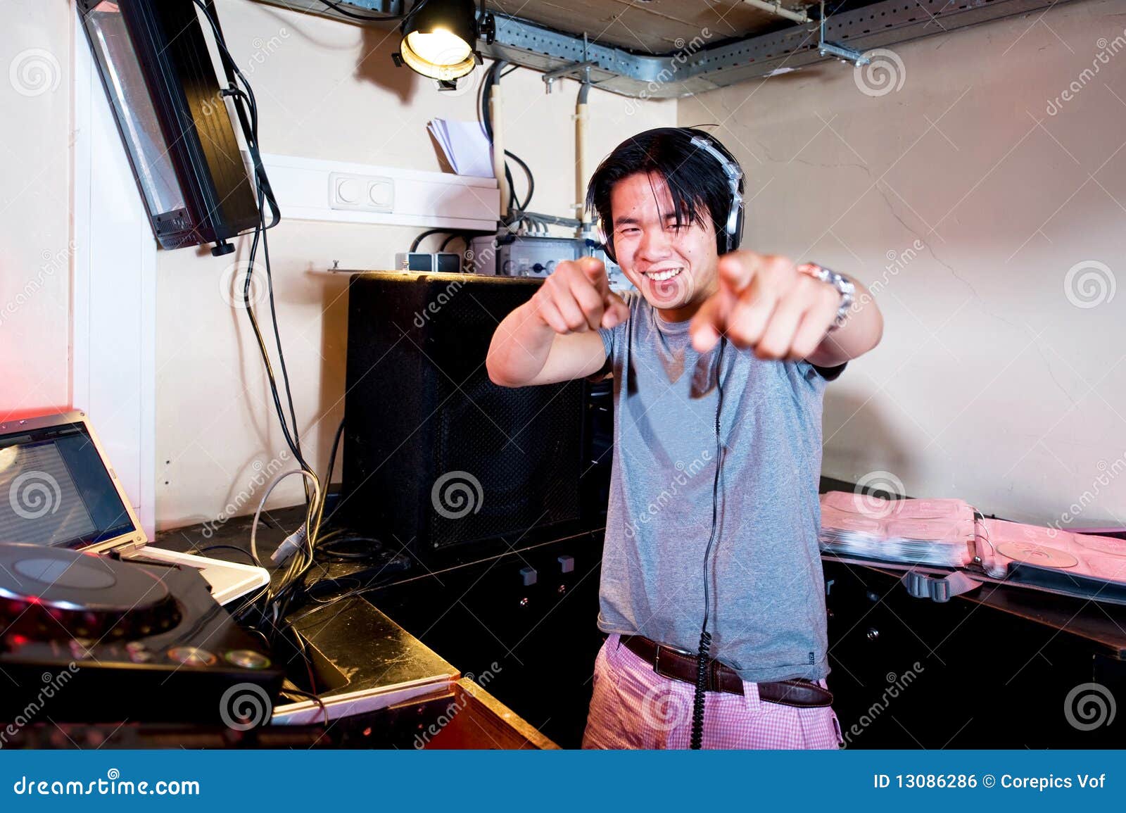 DJ in action stock photo. Image of fingers, shirt, smiling - 13086286
