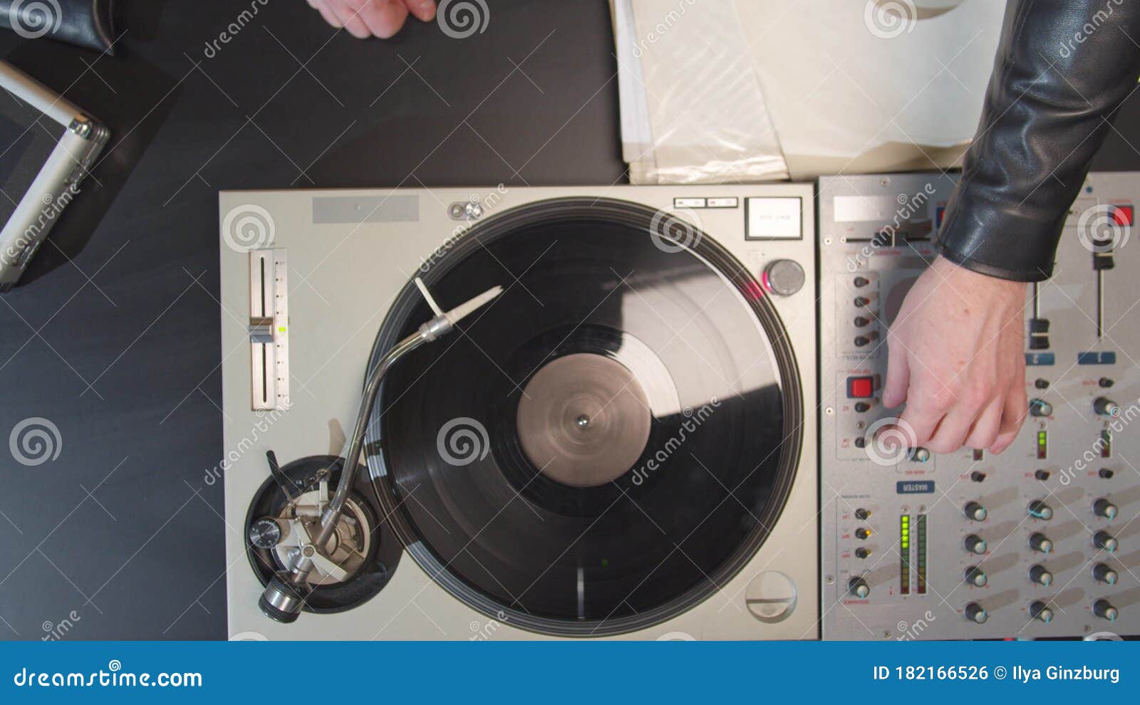 DJ Adjusts the Sound Using a Mixer. Top View Stock Photo - Image of ...