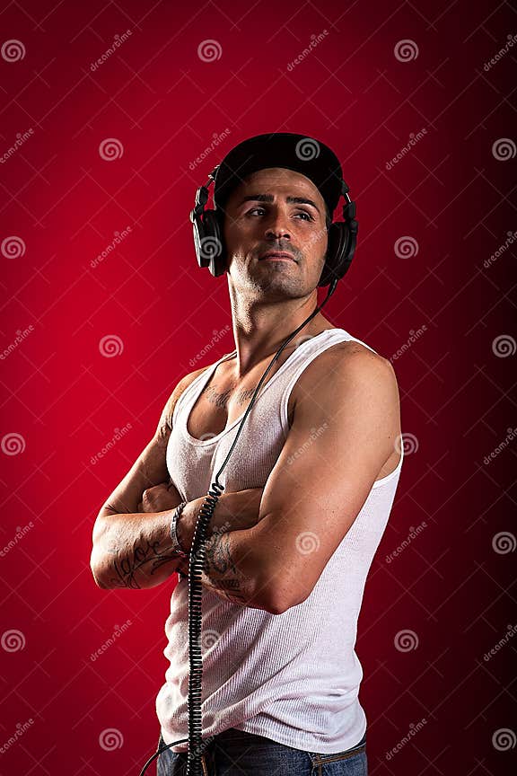 DJ in Front of a Red Background Stock Photo - Image of headphones ...