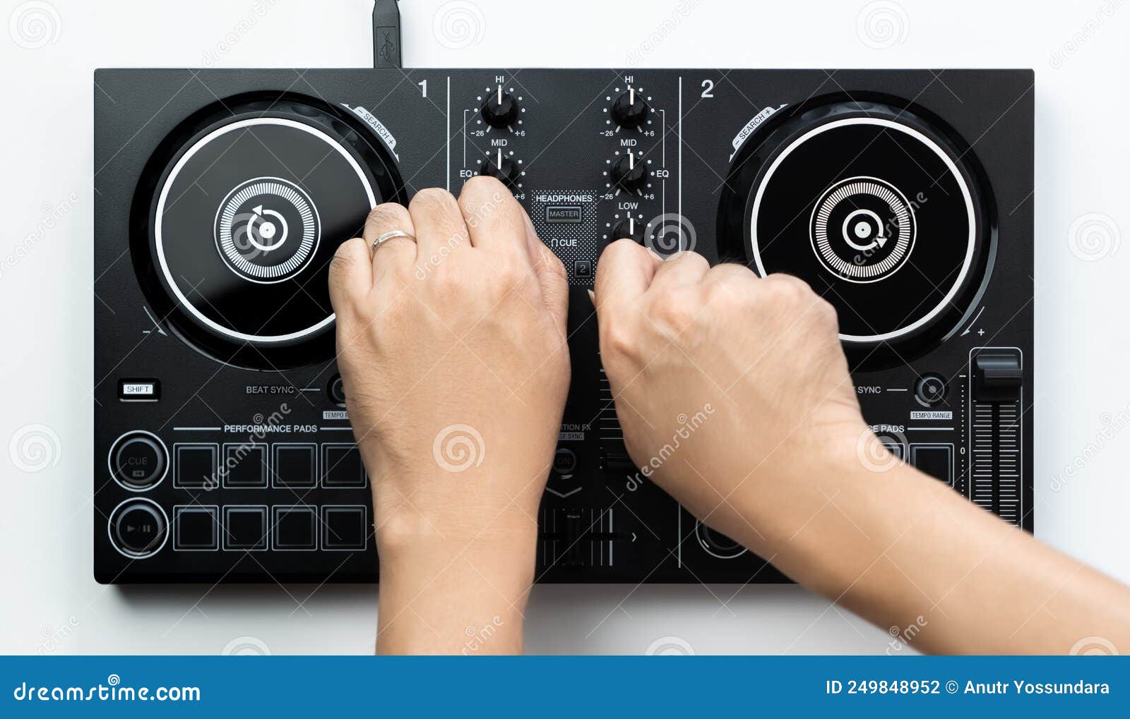 DJ Hands Mixing Music on DJ Digital Mixing Controller Top View on White ...