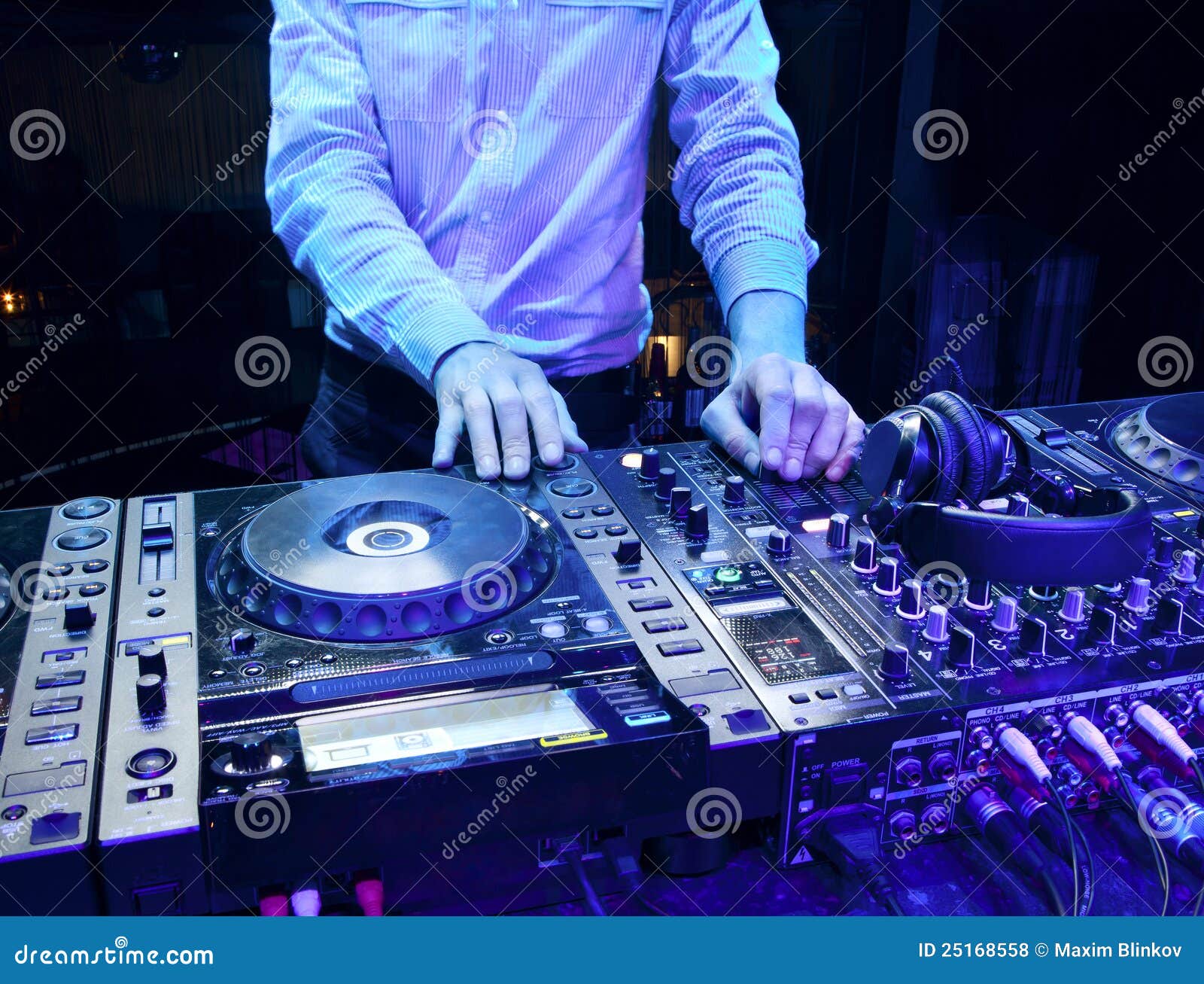 Dj mixes the track stock photo. Image of disco, evening - 25168558
