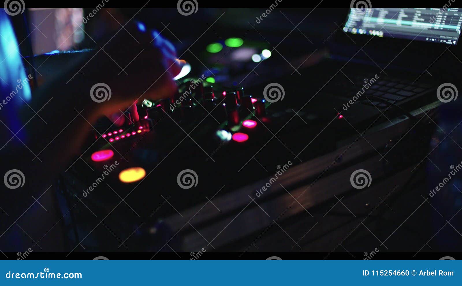 DJ Playing in a Large Trance Party with Large Crowd of People Dancing ...