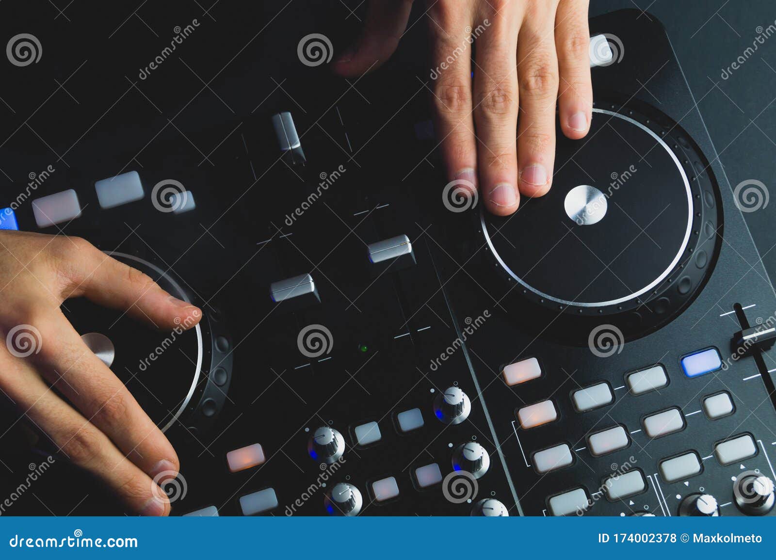 DJ Plays Music. Sound Mixer Controller with Knobs and Sliders. Hands on ...