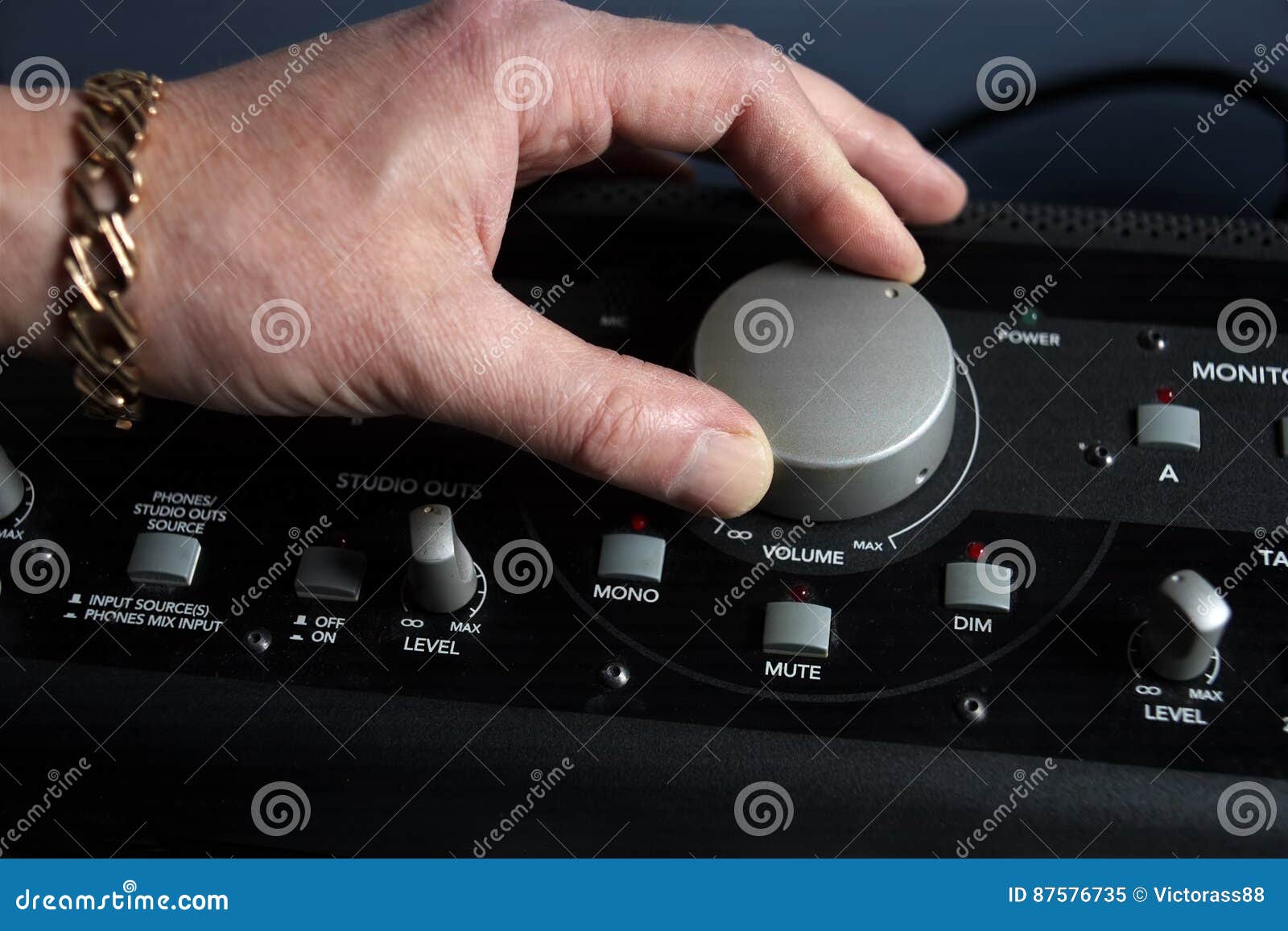 DJ Pushing Volume Up stock image. Image of equipment - 87576735