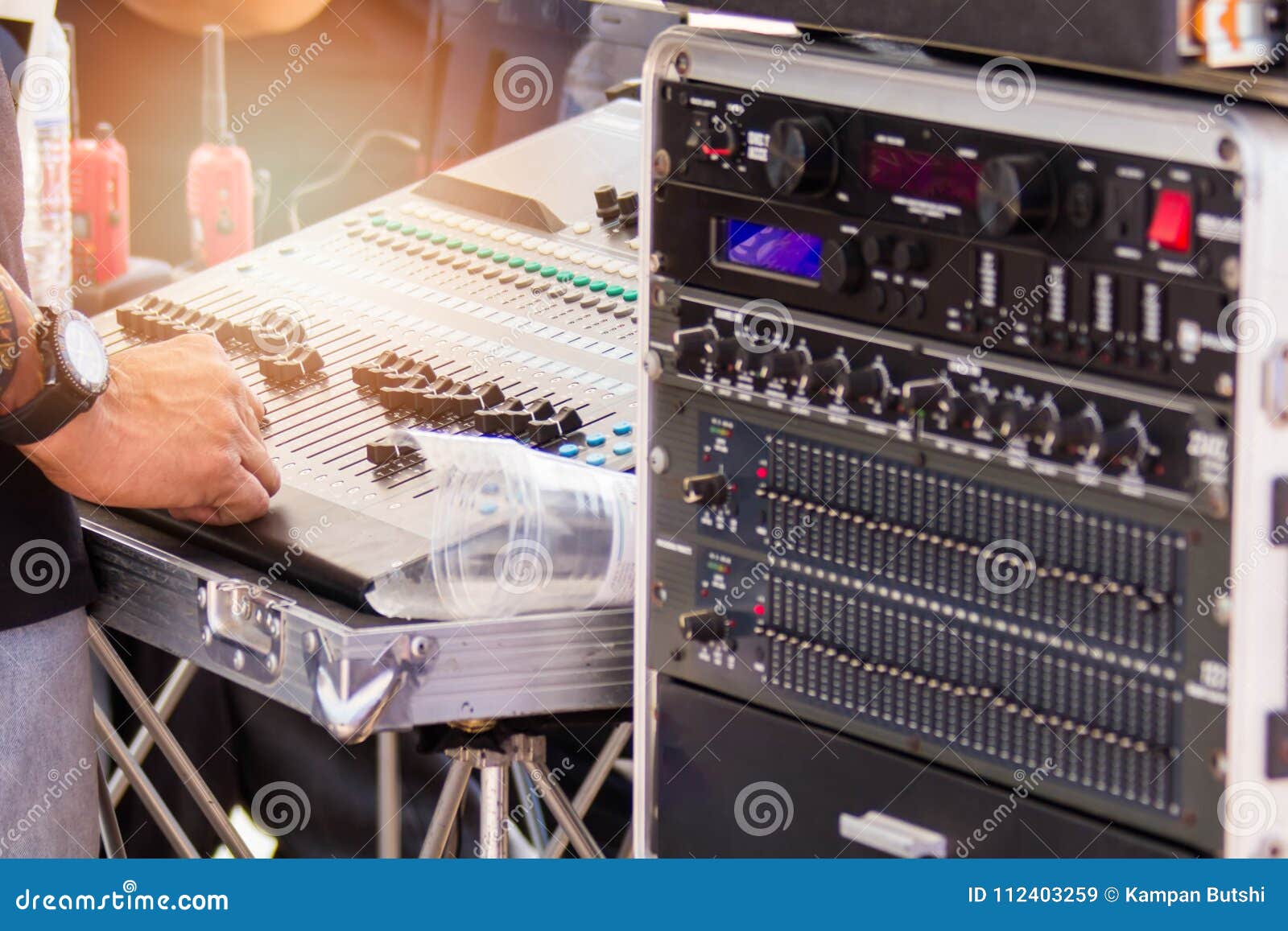 DJ are Using Their Hands To Adjust the Volume and Test the Sound To the ...