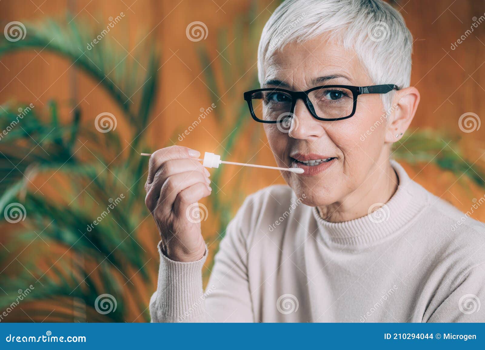 DNA Genetic Testing, Using Saliva Sample Stock Photo - Image of person ...