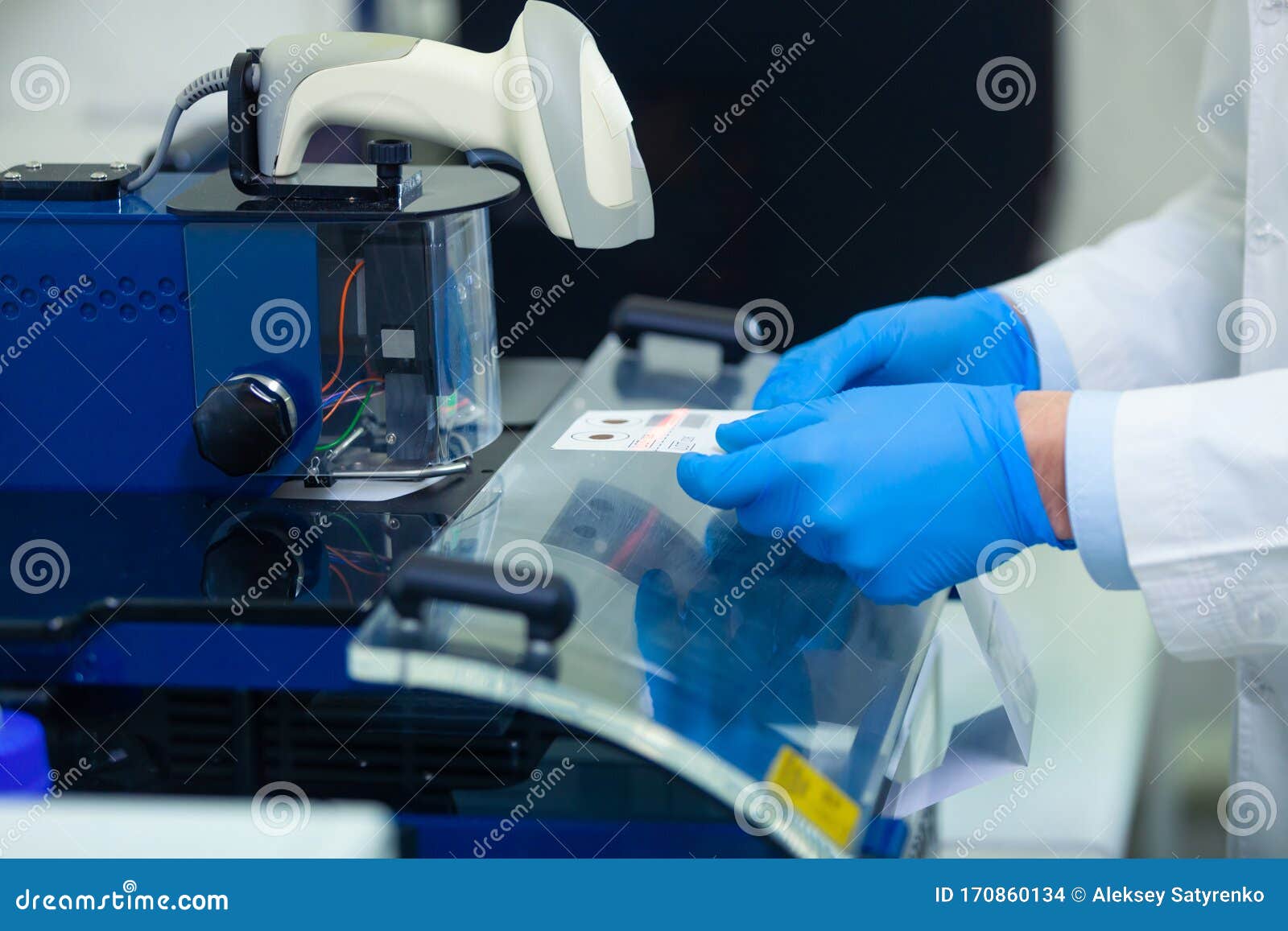 DNA Laboratory. the Expert Puts the Human DNA into the Database Using ...