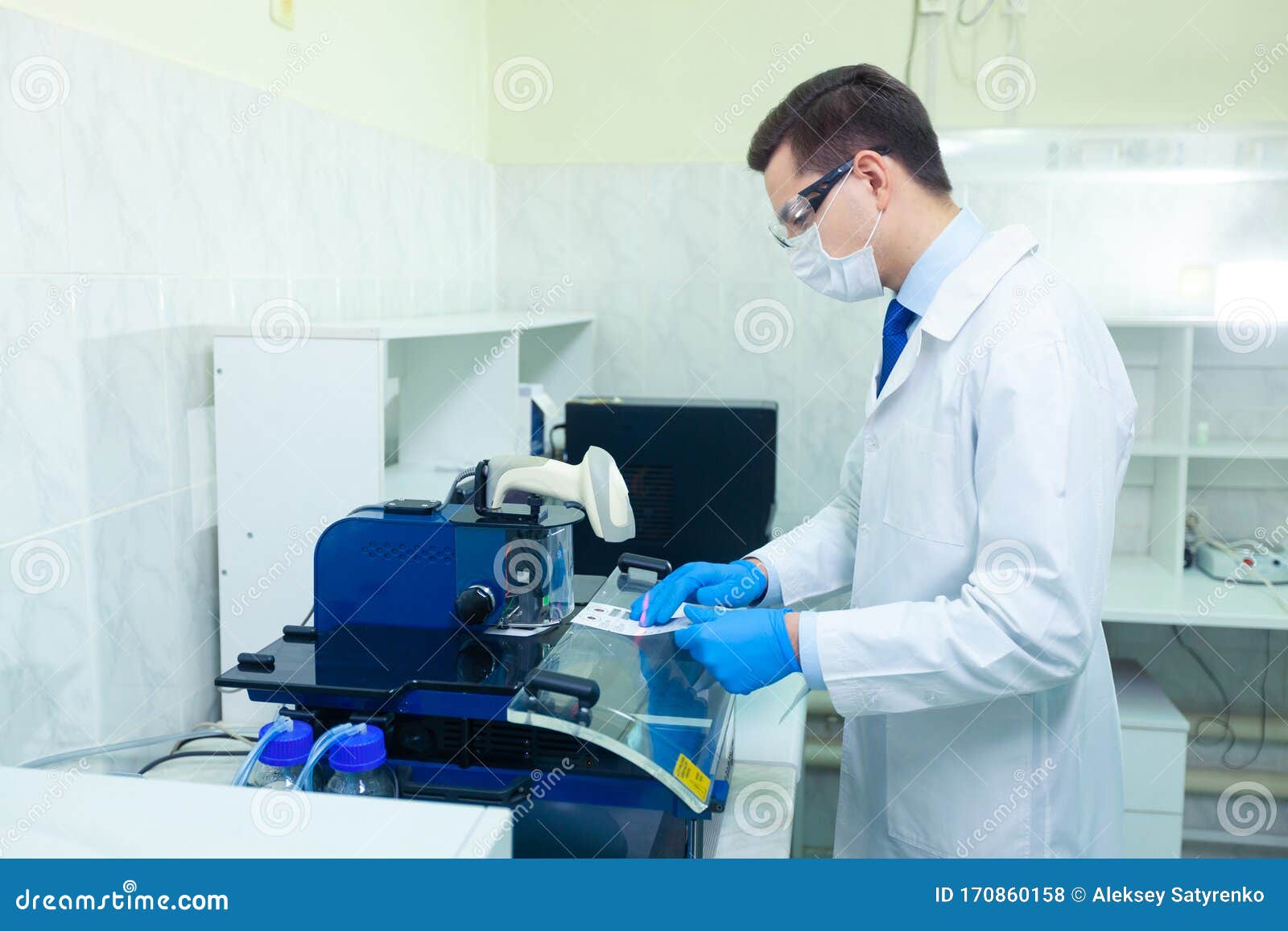 DNA Laboratory. the Expert Puts the Human DNA into the Database Using ...