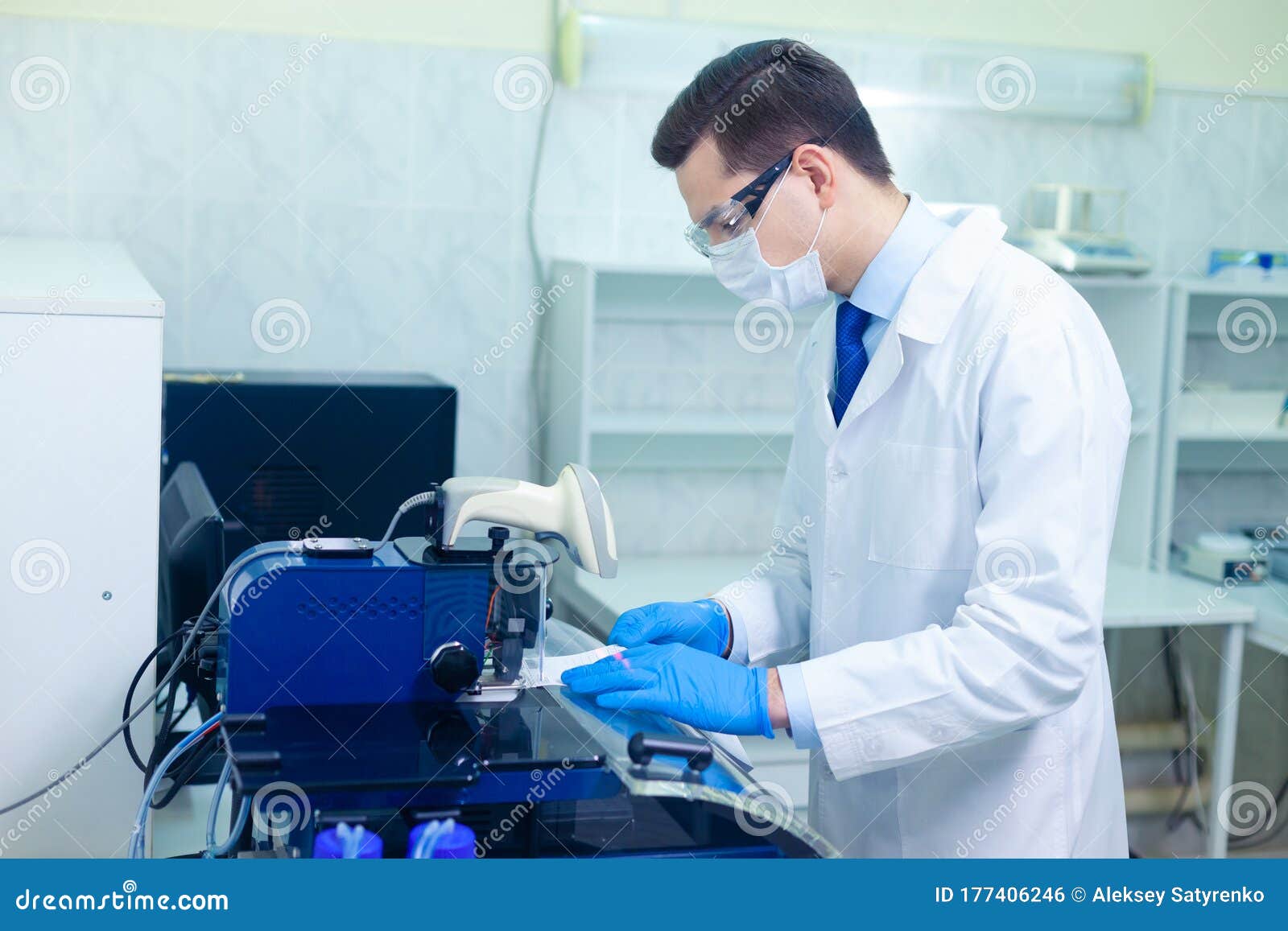 DNA Laboratory. the Expert Puts the Human DNA into the Database Using ...
