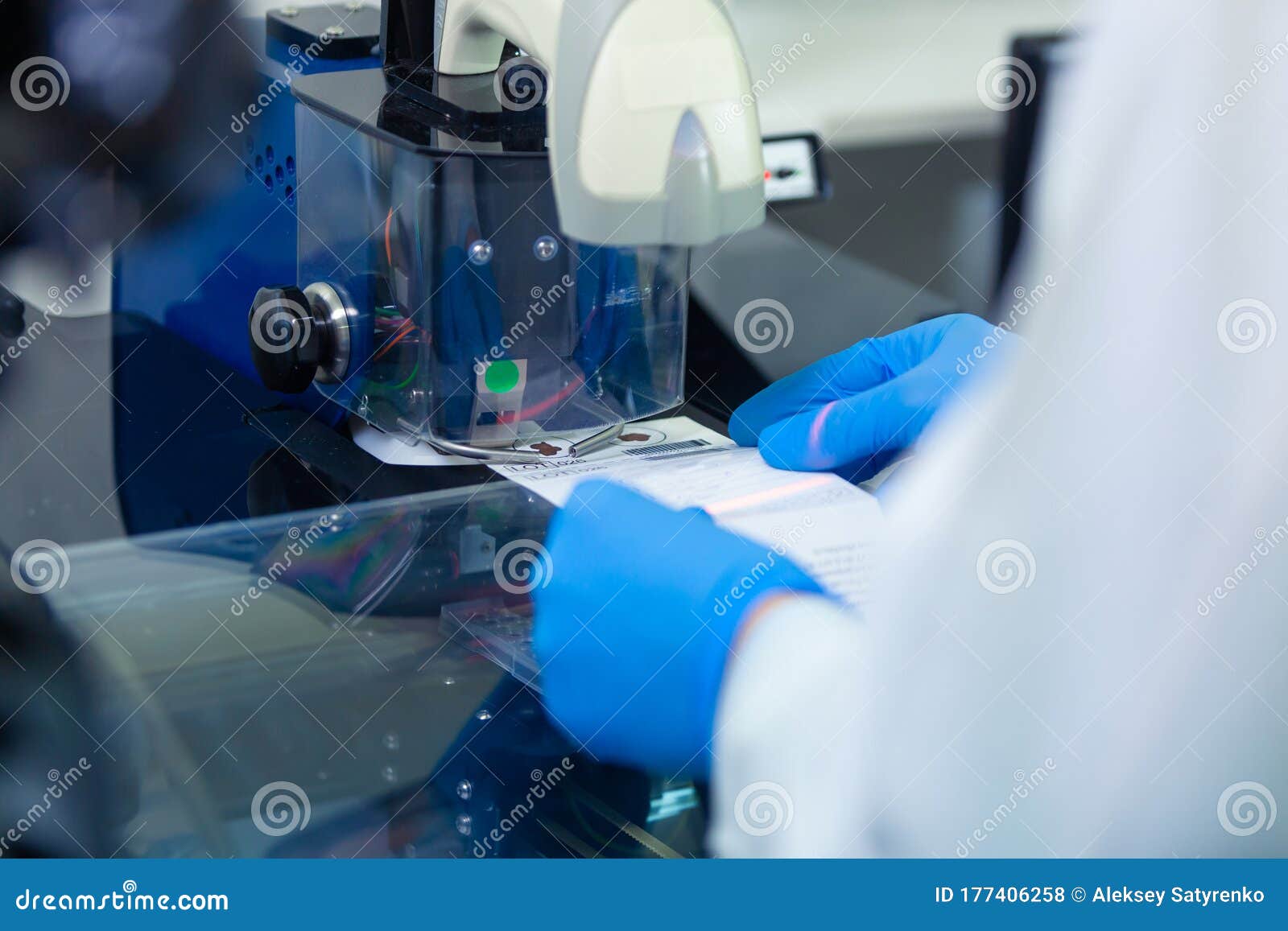 DNA Laboratory. the Expert Puts the Human DNA into the Database Using ...