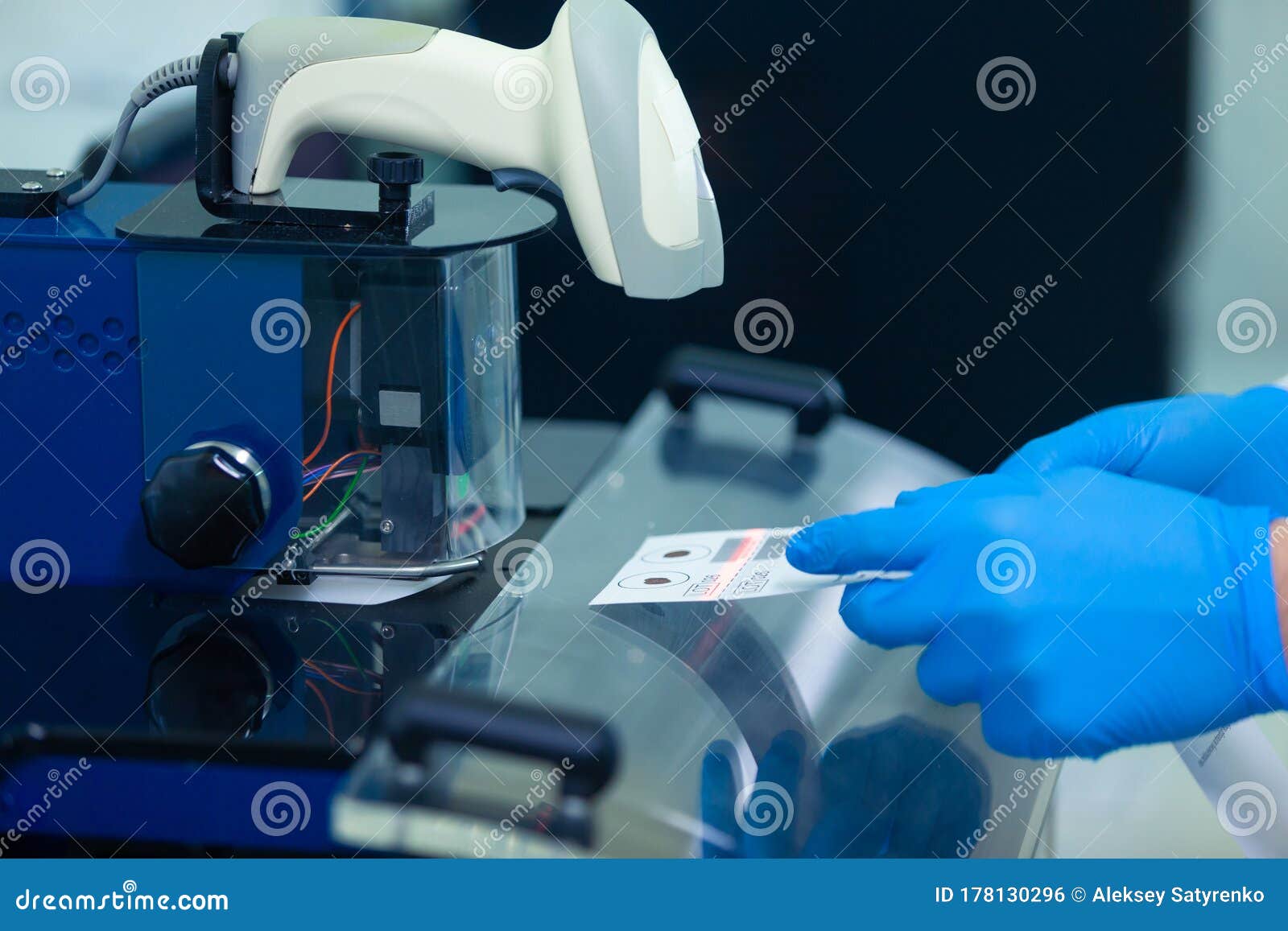 DNA Laboratory. the Expert Puts the Human DNA into the Database Using ...