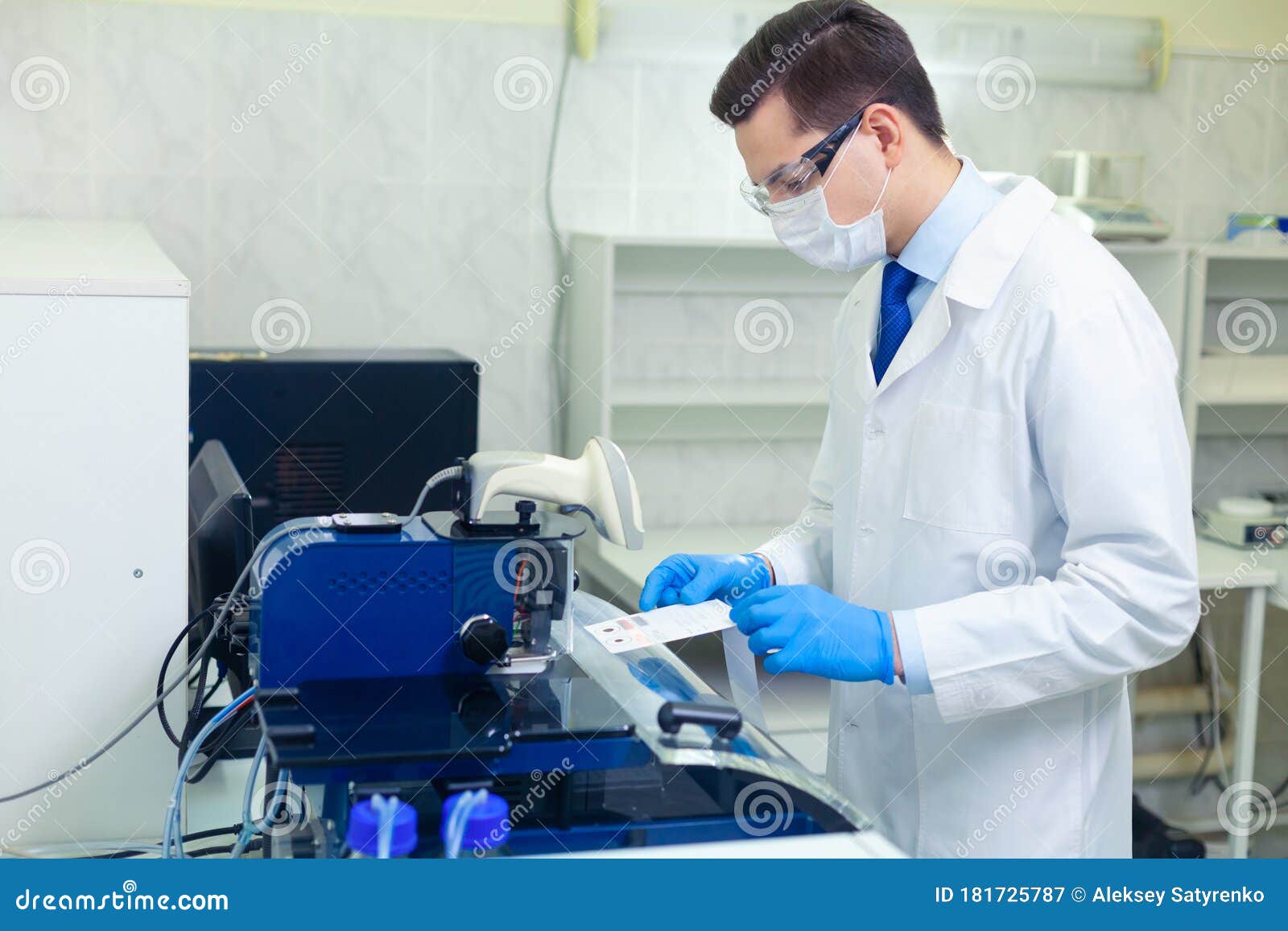 DNA Laboratory. the Expert Puts the Human DNA into the Database Using ...