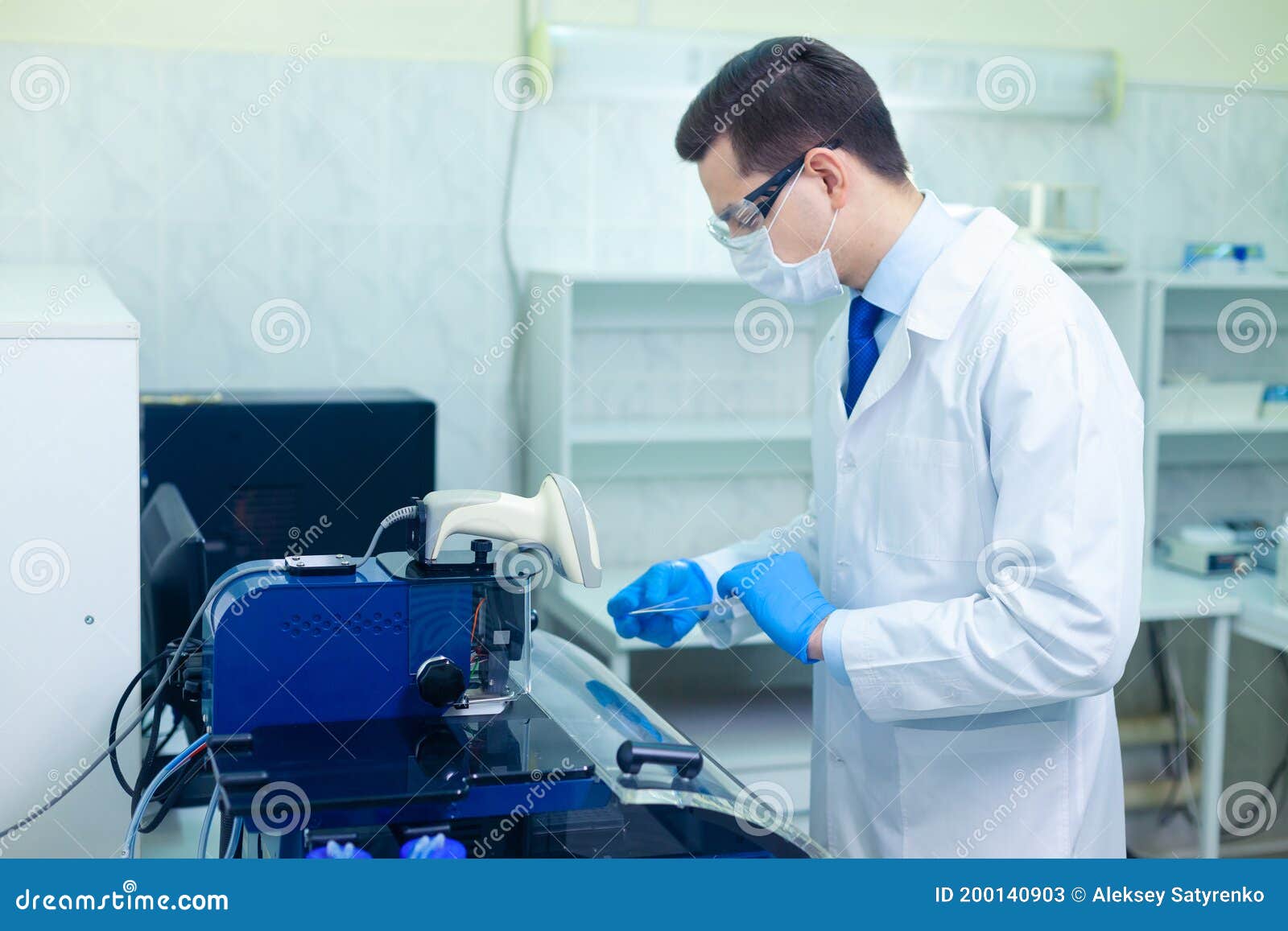 DNA Laboratory. the Expert Puts the Human DNA into the Database Using ...