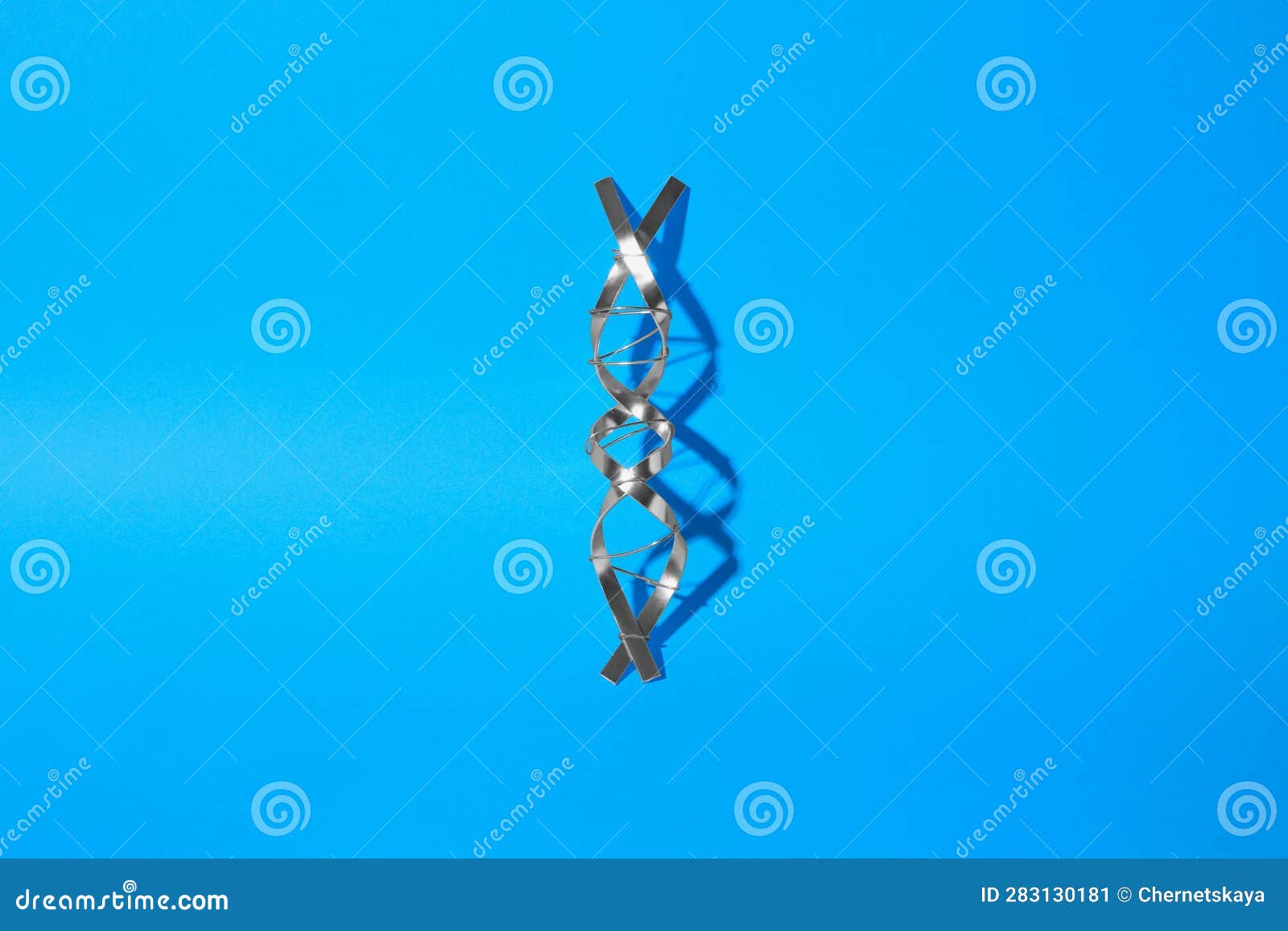DNA Molecular Chain Model Made of Metal on Blue Background, Top View ...