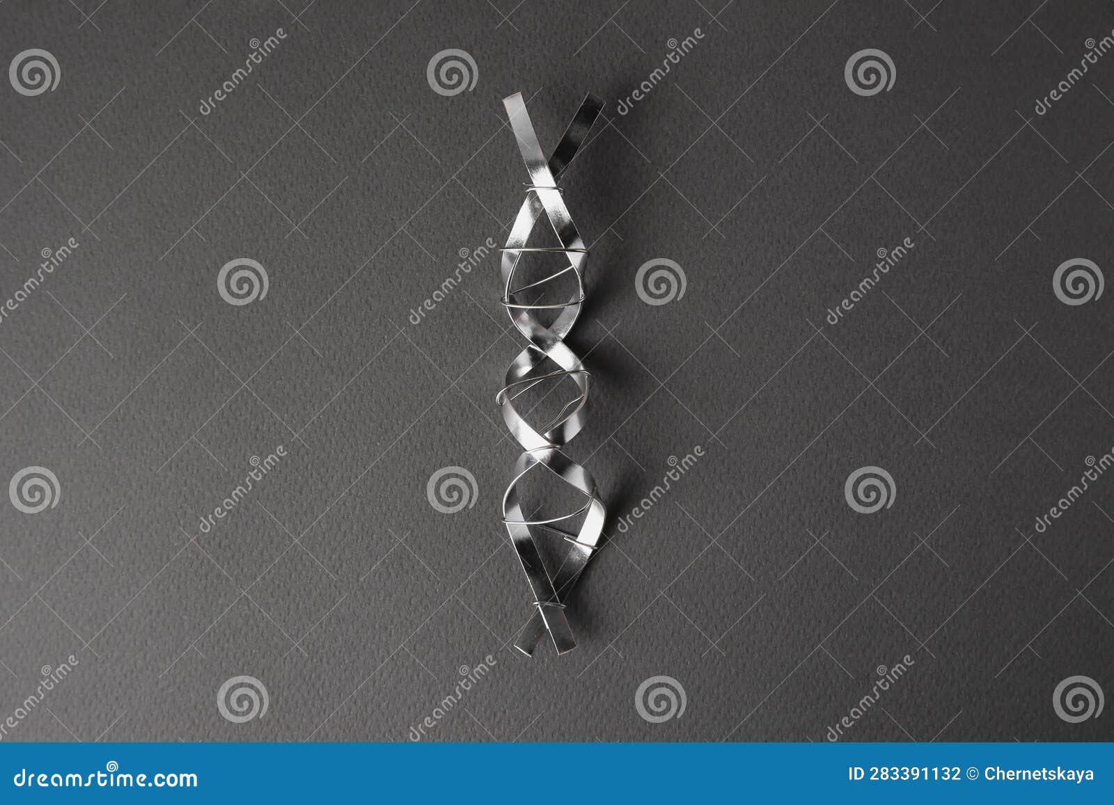 DNA Molecular Chain Model Made of Metal on Grey Background, Top View ...