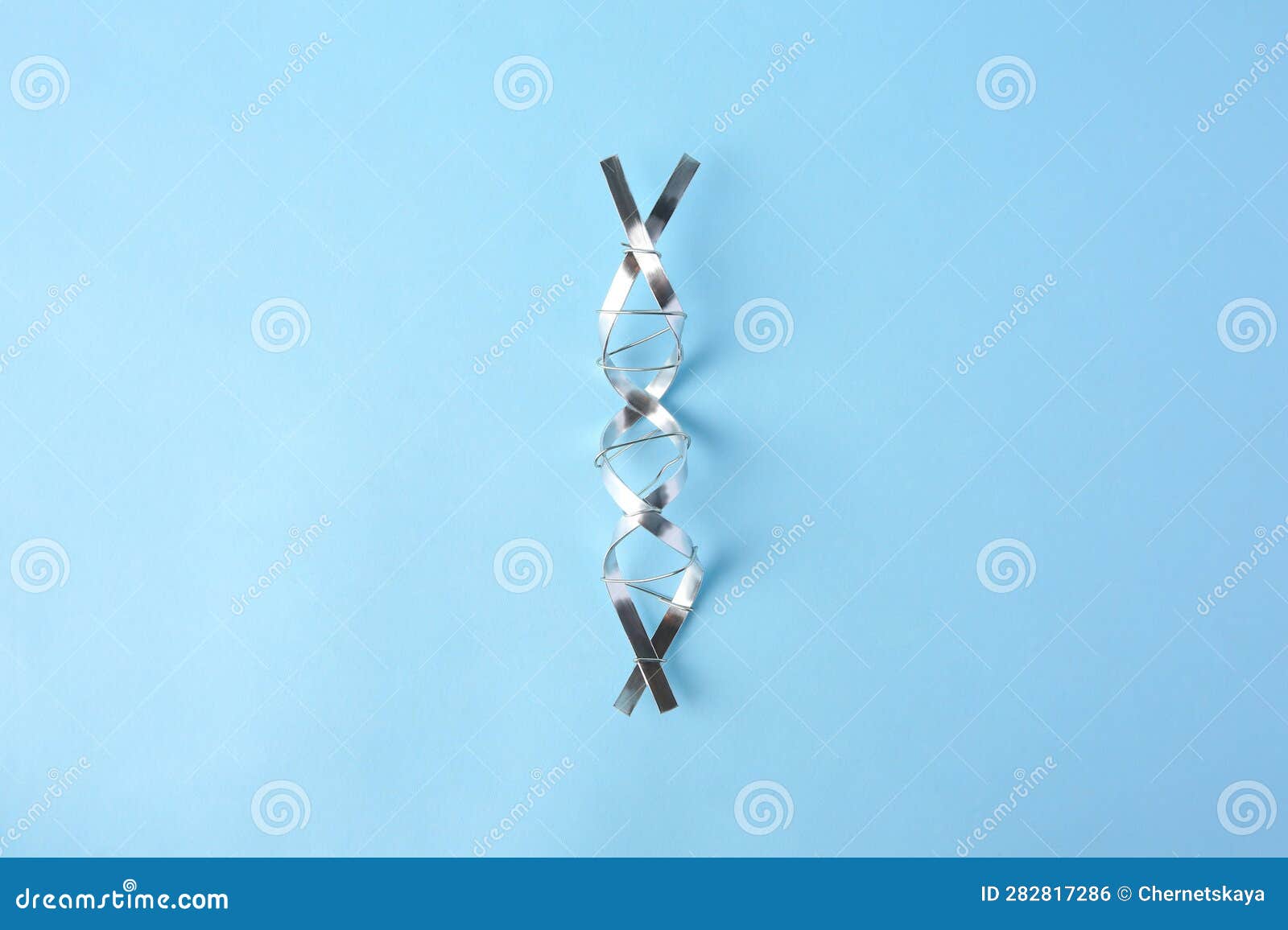 DNA Molecular Chain Model Made of Metal on Light Blue Background, Top ...