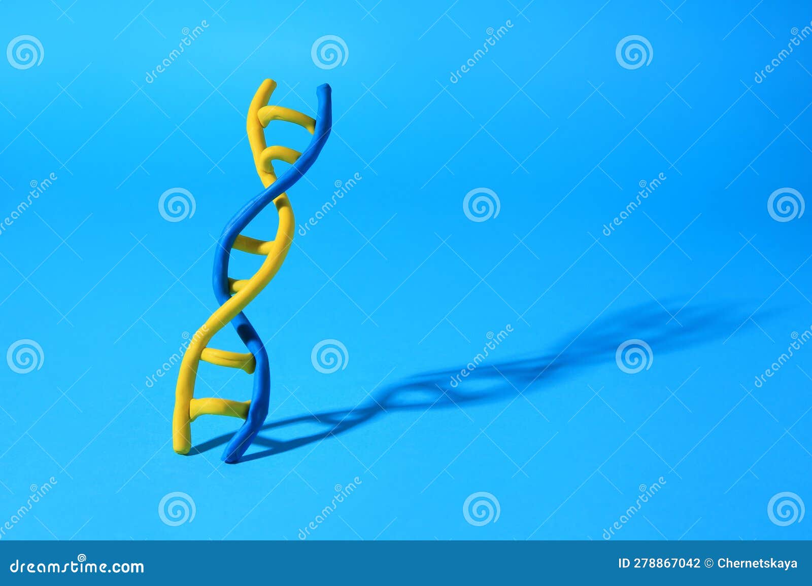 DNA Molecule Model Made of Colorful Plasticine on Light Blue Background ...