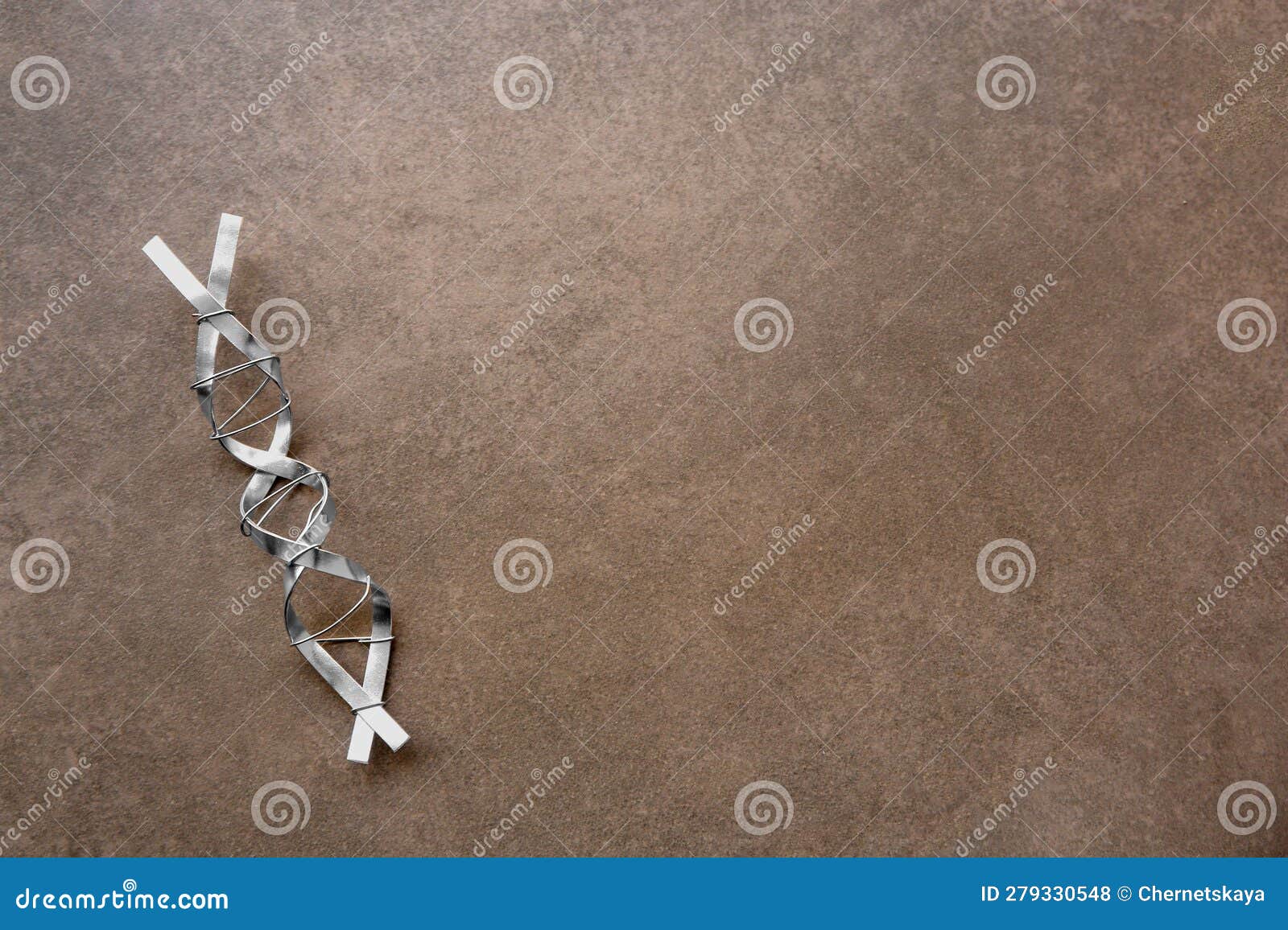 DNA Molecule Model Made of Metal on Brown Background, Top View. Space ...