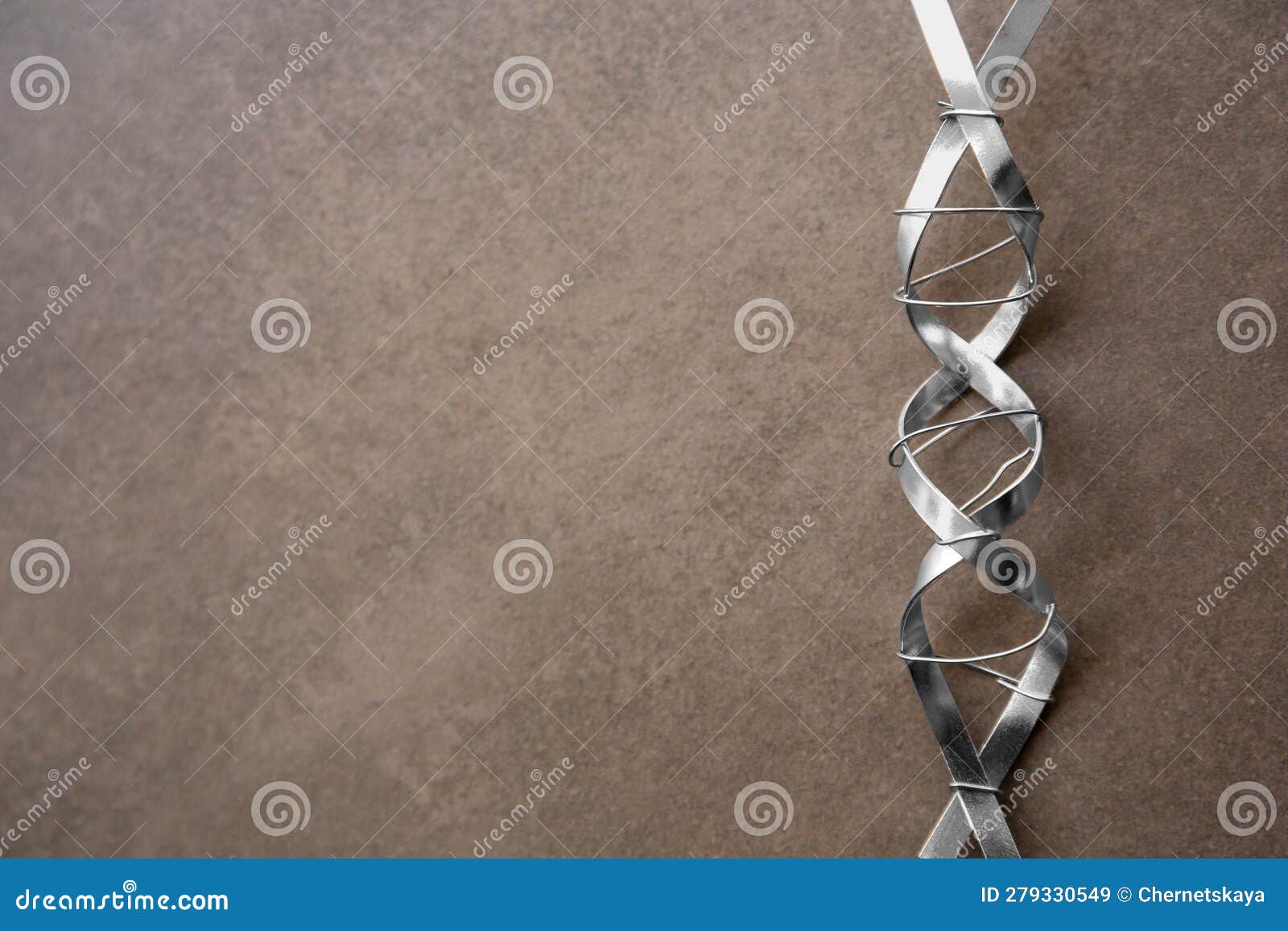 DNA Molecule Model Made of Metal on Brown Background, Top View. Space ...