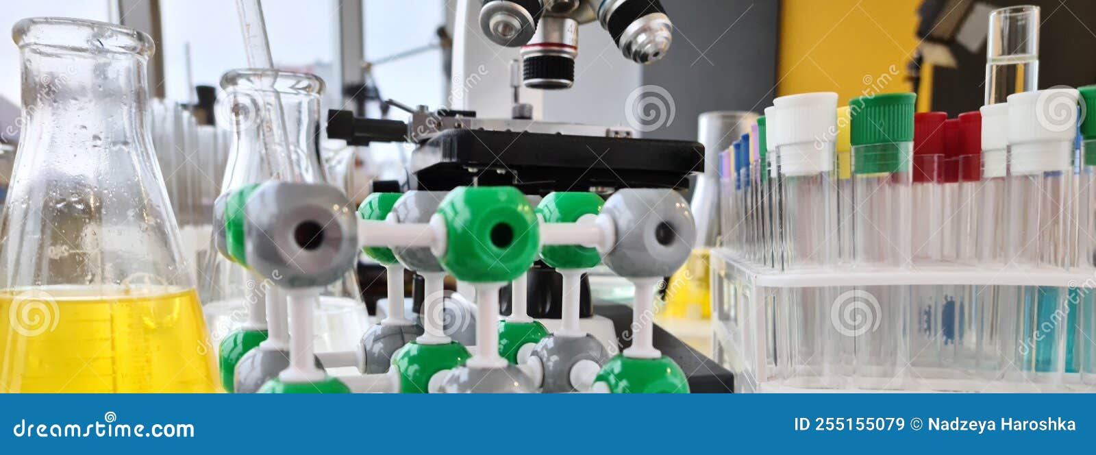 DNA Molecule in Test Tubes and Microscope in Laboratory Stock Image ...