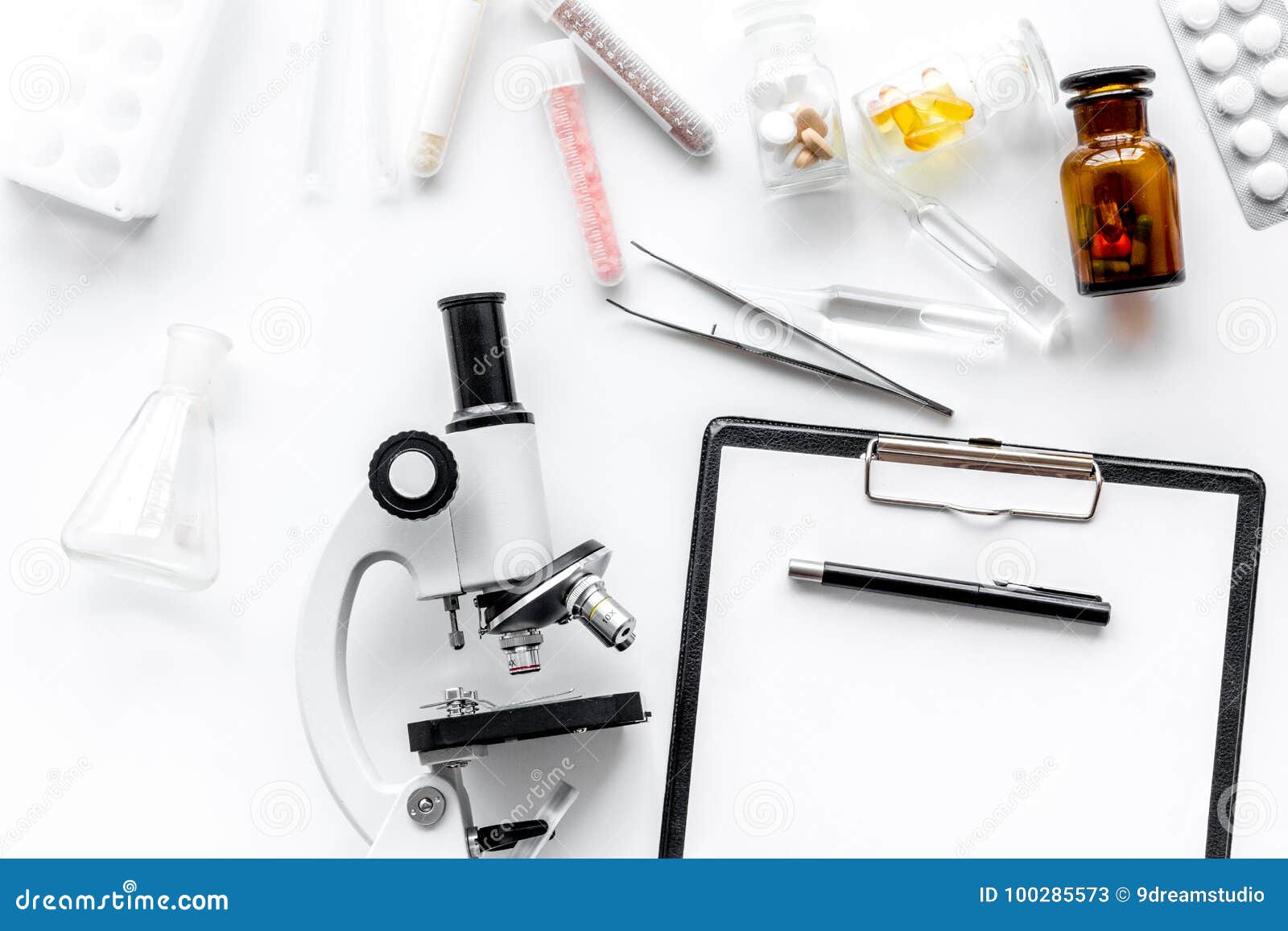 Do Medcal Tests. Microscope, Tablet, Pills and Test Tube on White ...