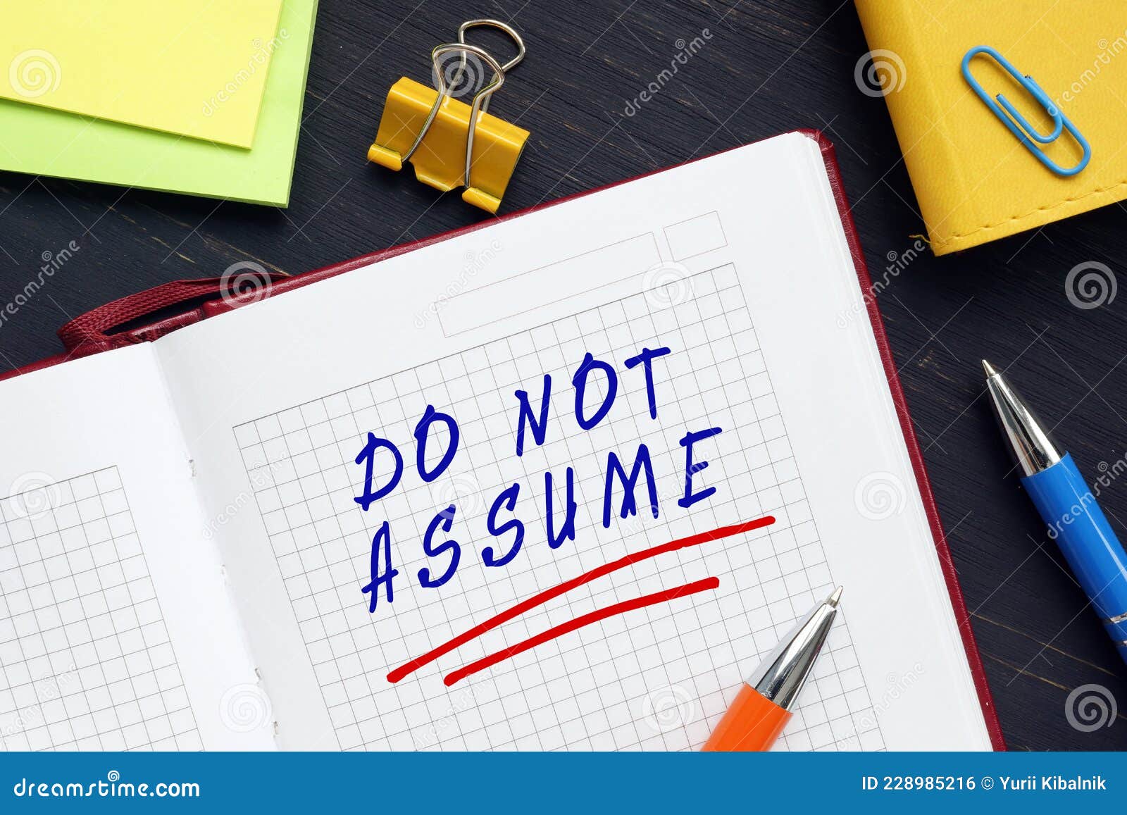 DO NOT ASSUME Phrase on the Sheet Stock Photo - Image of persistence ...