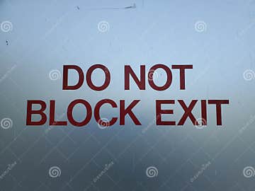 Do Not Block the Exit Sign in Red Letters on White Background Stock ...